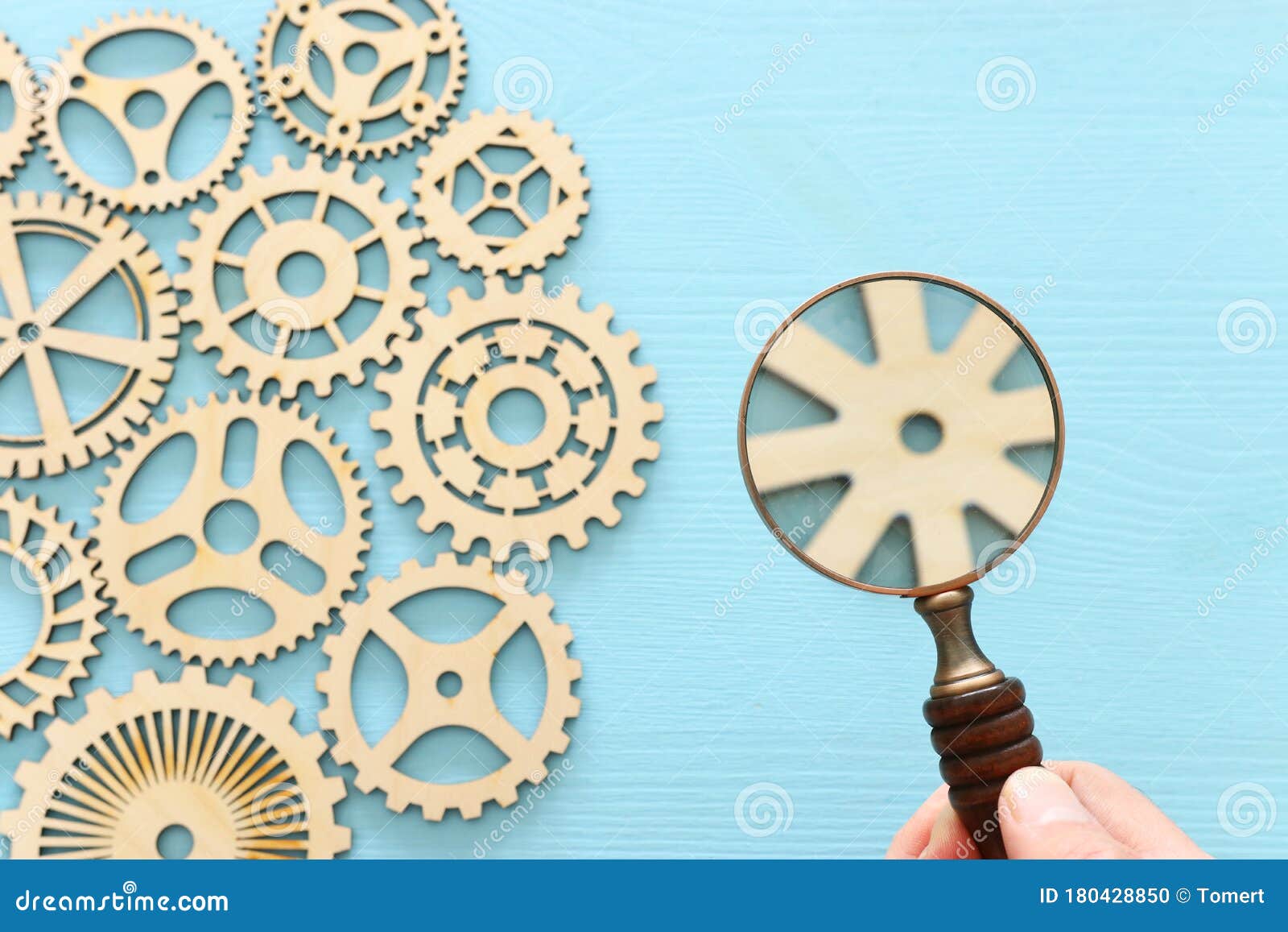 Hand Placing a Cogwheel in Set of Gears Mechanism Stock Photo - Image ...