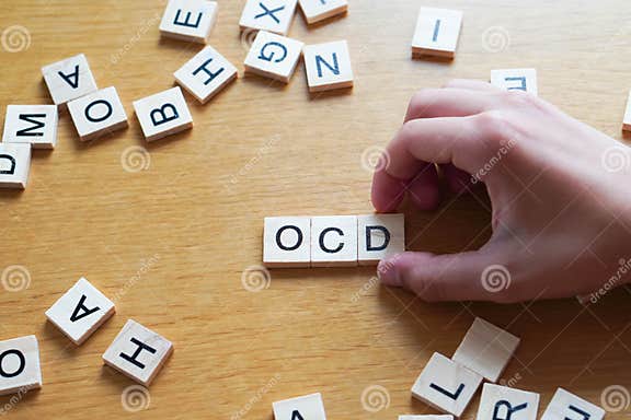 Hand Placing the Letters OCD Obsessive Compulsive Disorder Stock Image ...