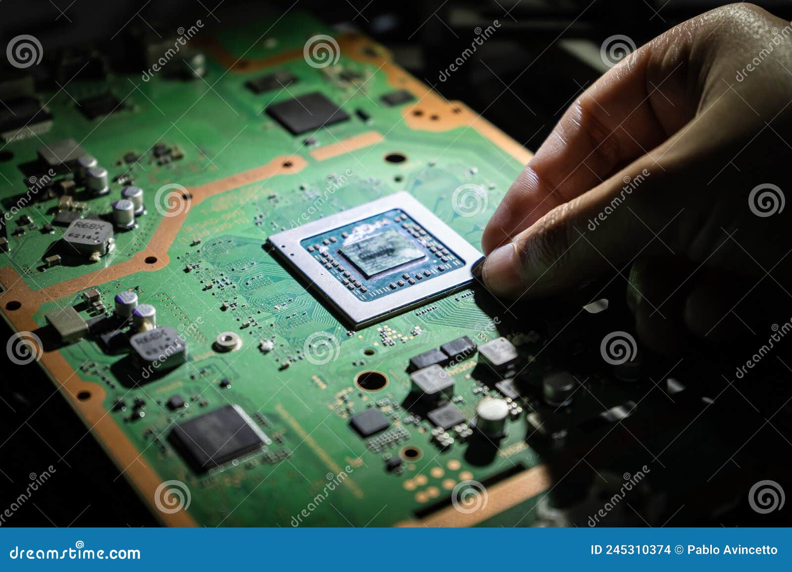 Hand Placing Microprocessor on Board Stock Photo - Image of component ...