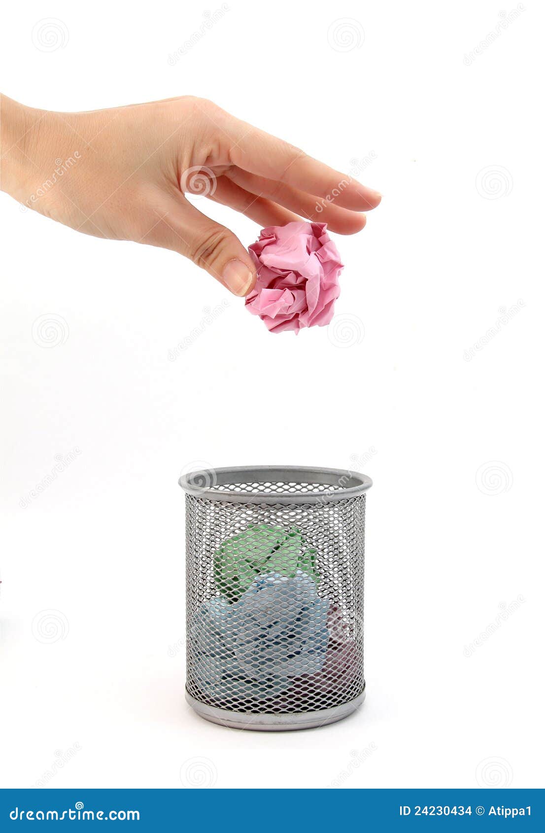A Hand Placing Paper in Trash Can Stock Photo - Image of office ...
