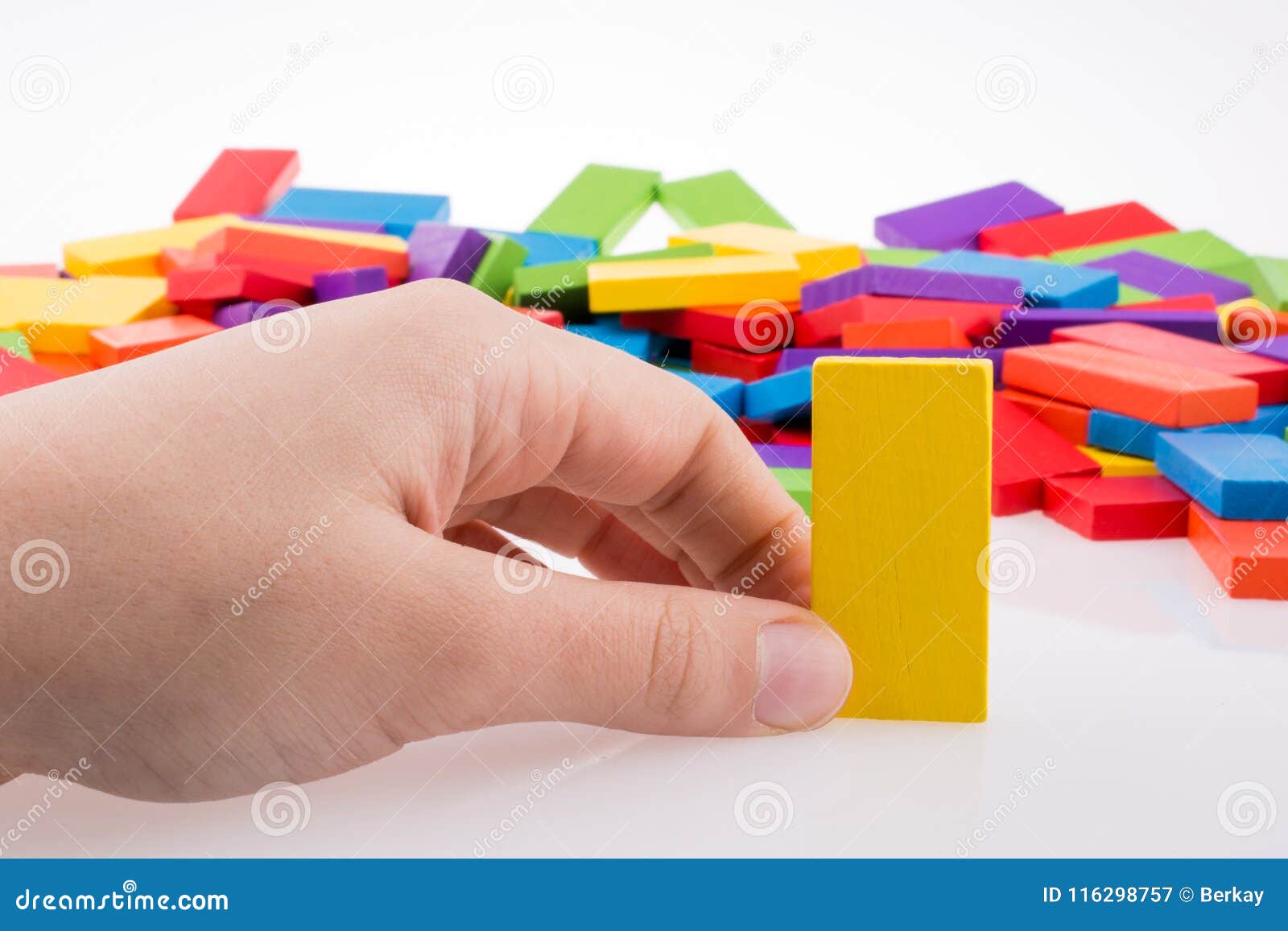 Hand Playing with Colored Domino Stock Image - Image of game, dominoes ...