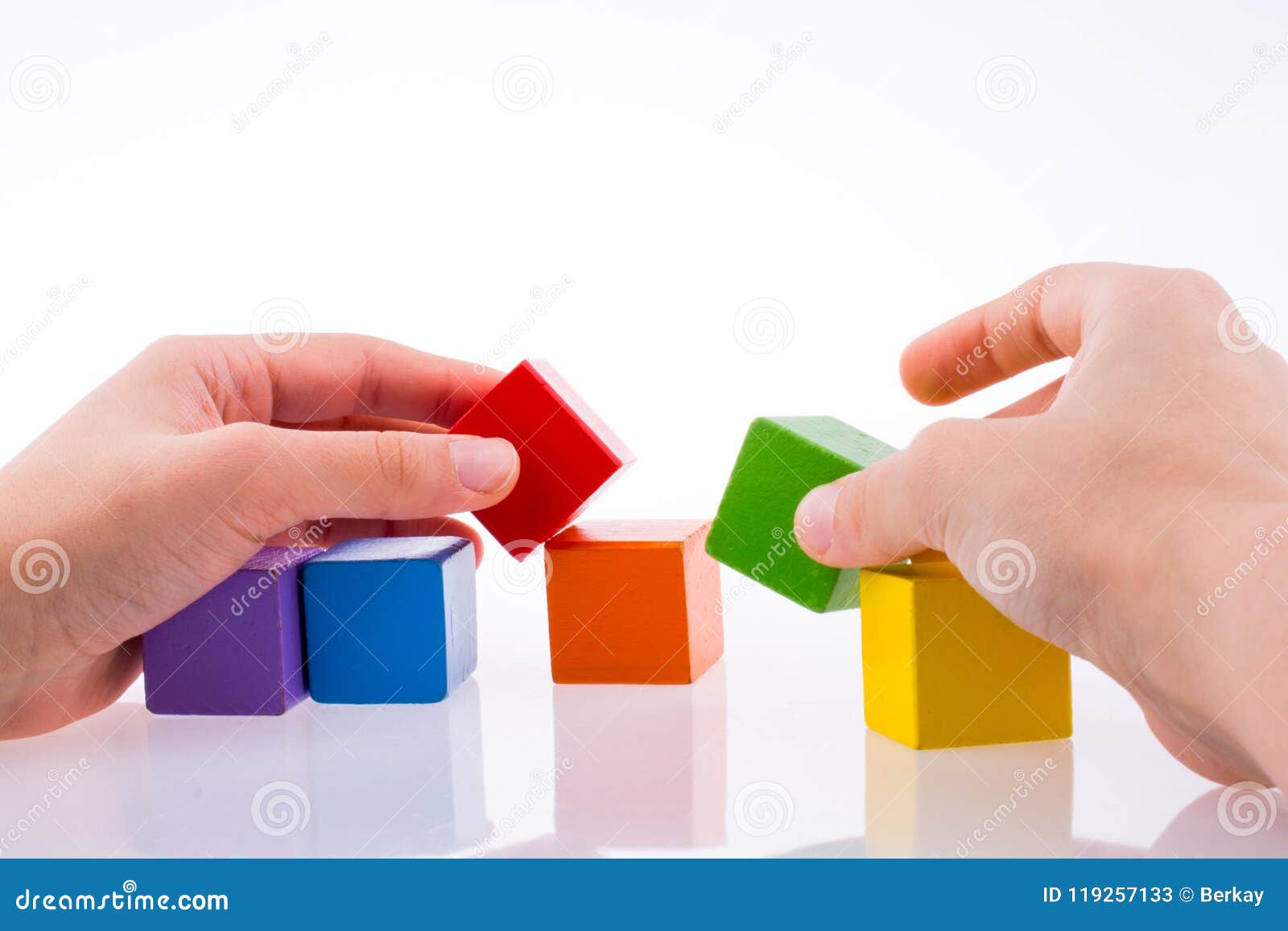 Hand playing with cubes stock image. Image of concept - 119257133