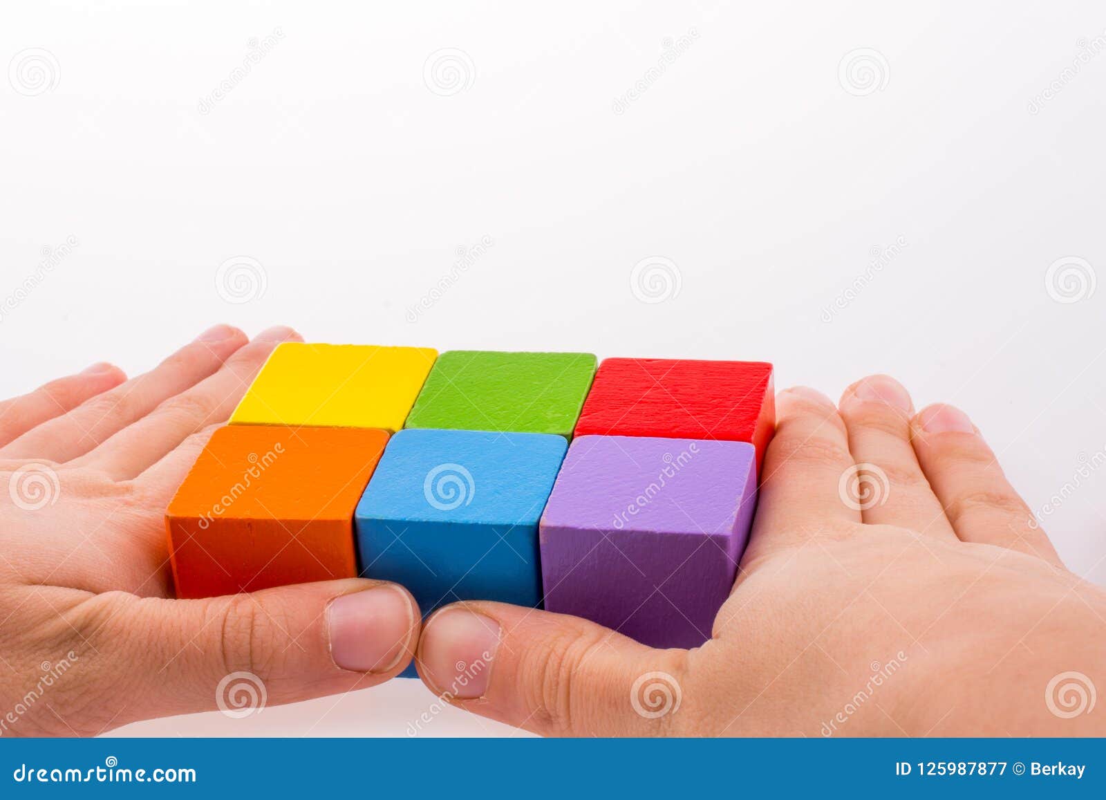 Hand playing with cubes stock image. Image of play, isolated - 125987877
