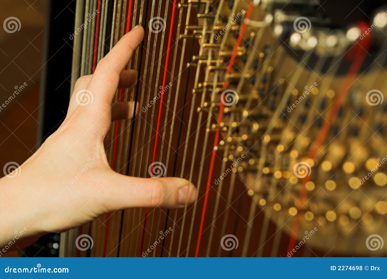 Hand playing harp stock photo. Image of classic, close - 2274698