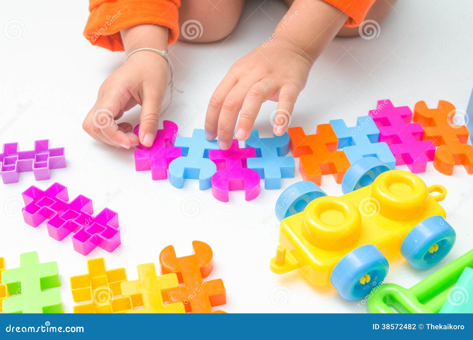 Hand playing toy stock photo. Image of creativity, wood - 38572482