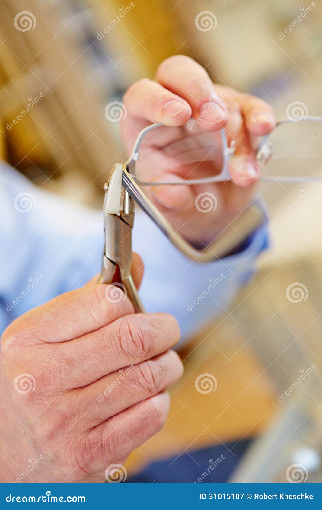 Hand with Pliers Reparing Glasses Stock Image - Image of glasses ...