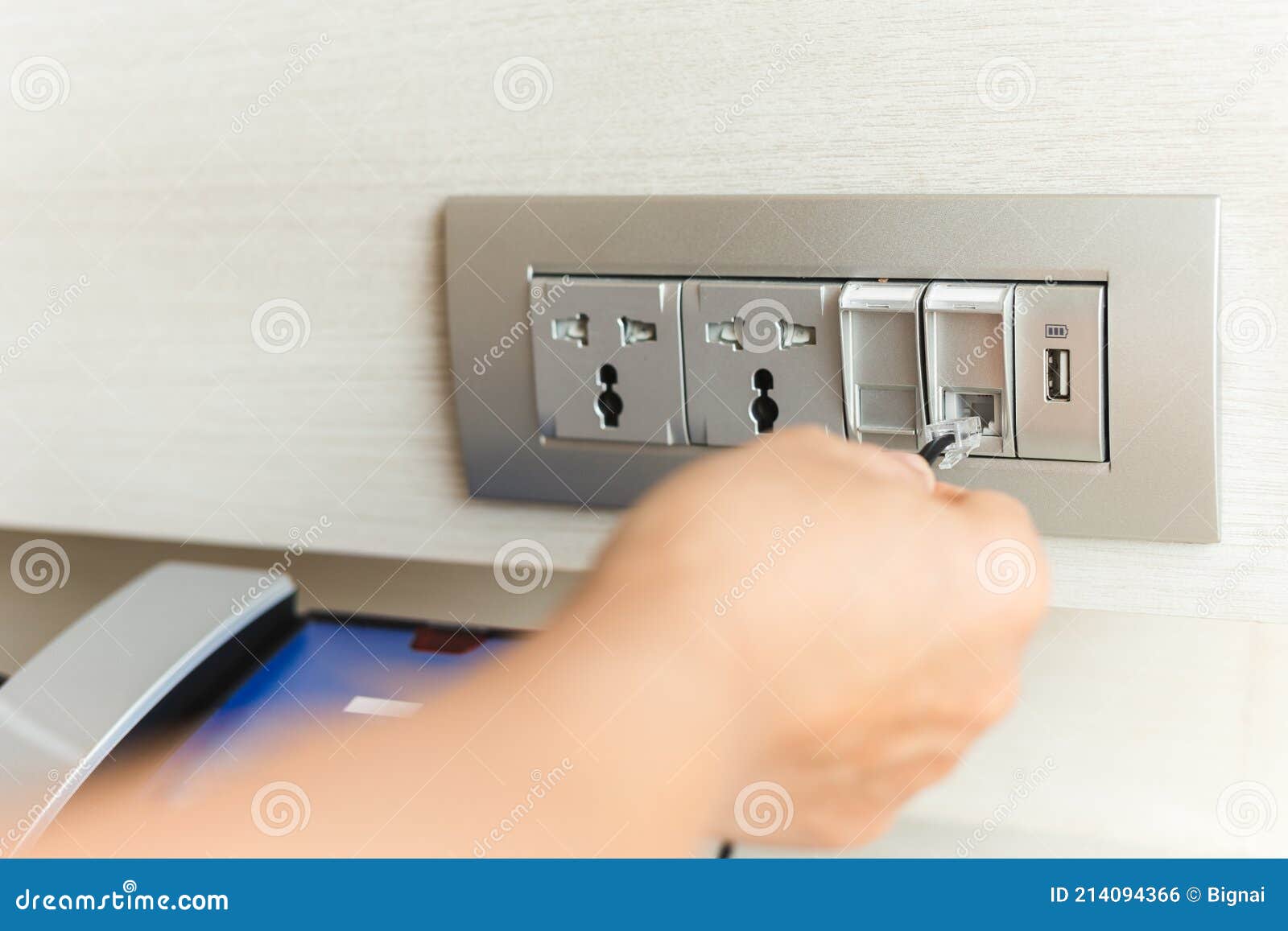 Hand Plug In Internet Cable Wire Into Extender Device Socket On The ...