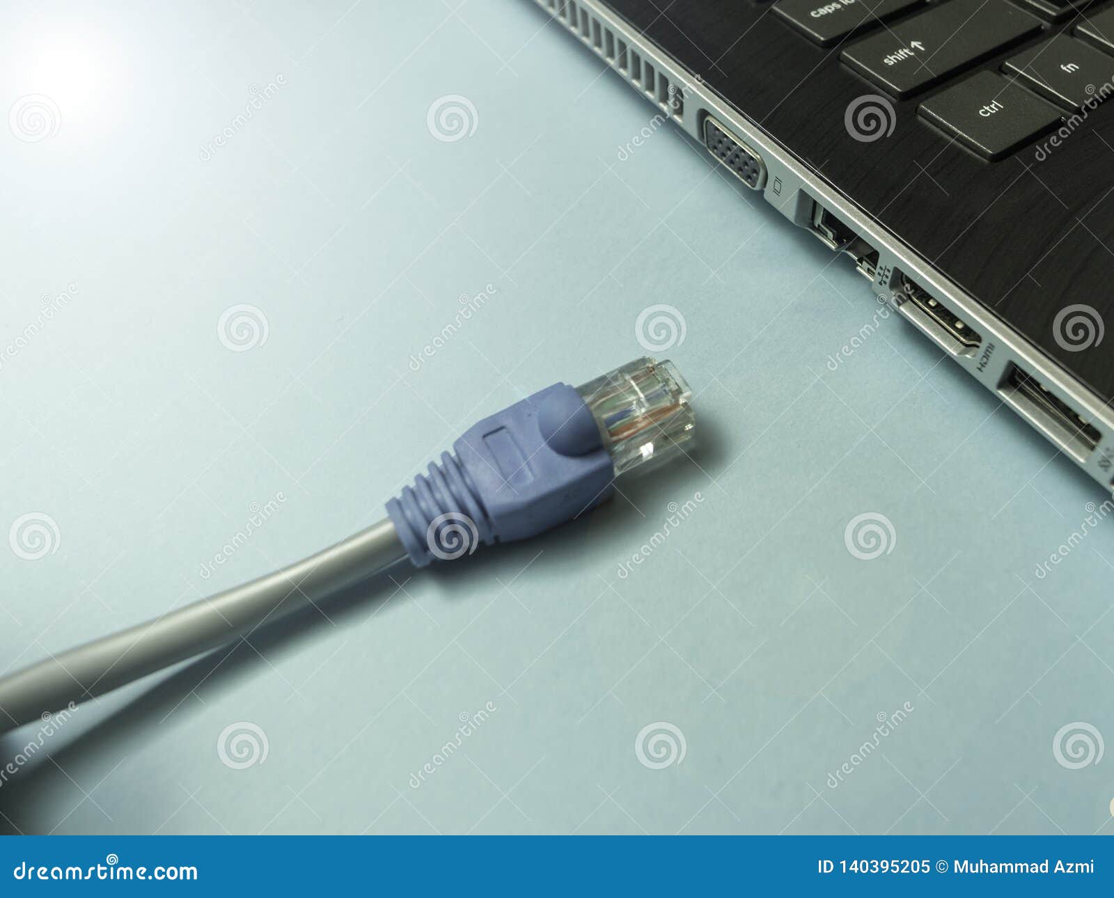 Hand Plugging in the Internet Cable To a Laptop Stock Image - Image of ...