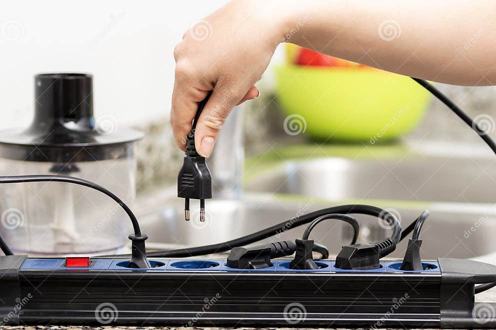 Hand Plugging a Plug in an Electrical Socket Stock Photo - Image of ...
