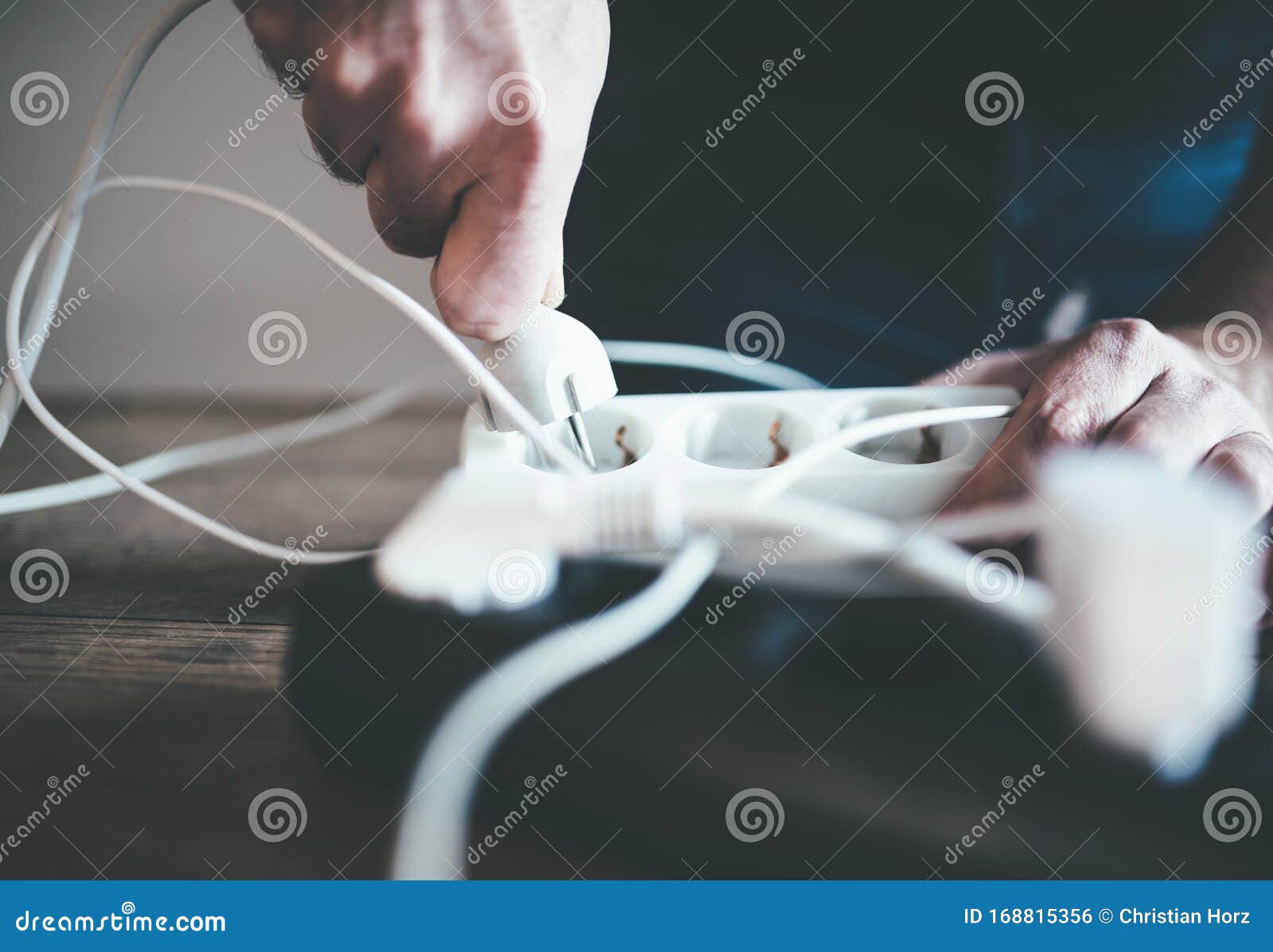 Hand Plugging Power Cord into Power Strip Outlet Stock Photo - Image of ...