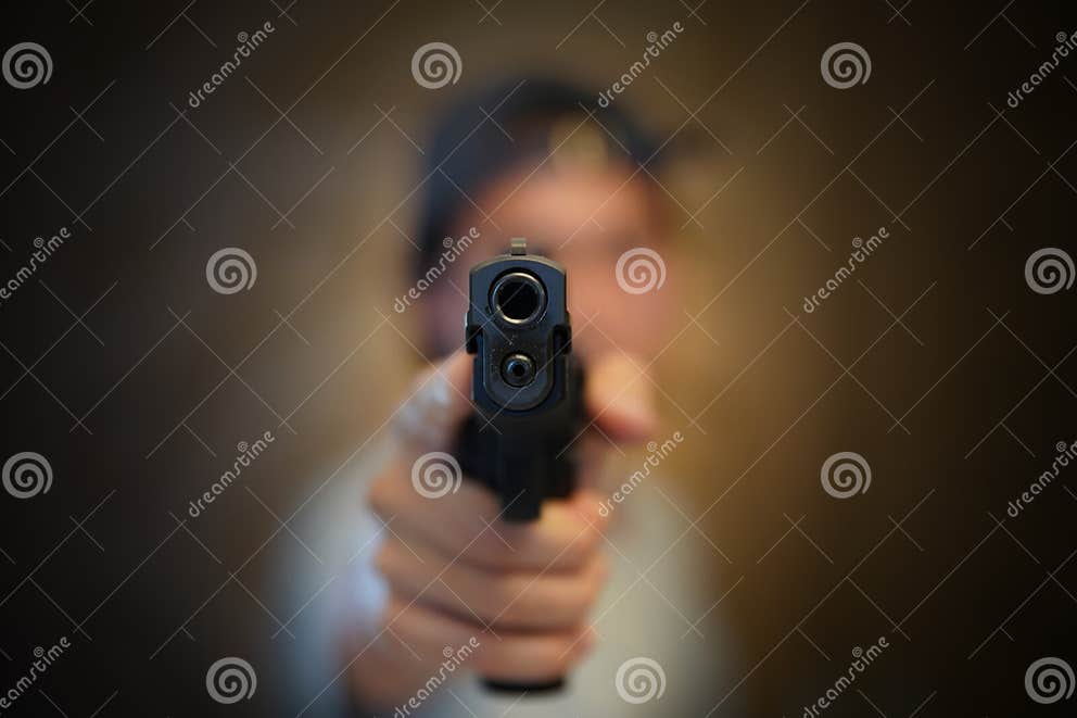 Hand Pointing a Gun Forward Stock Image - Image of outlaw, point: 100970021