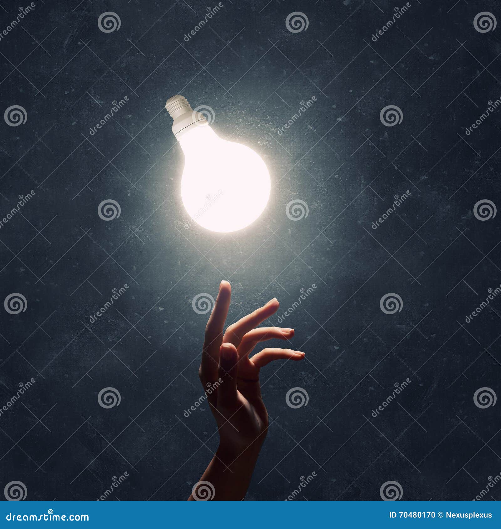 Hand pointing light bulb stock photo. Image of light - 70480170