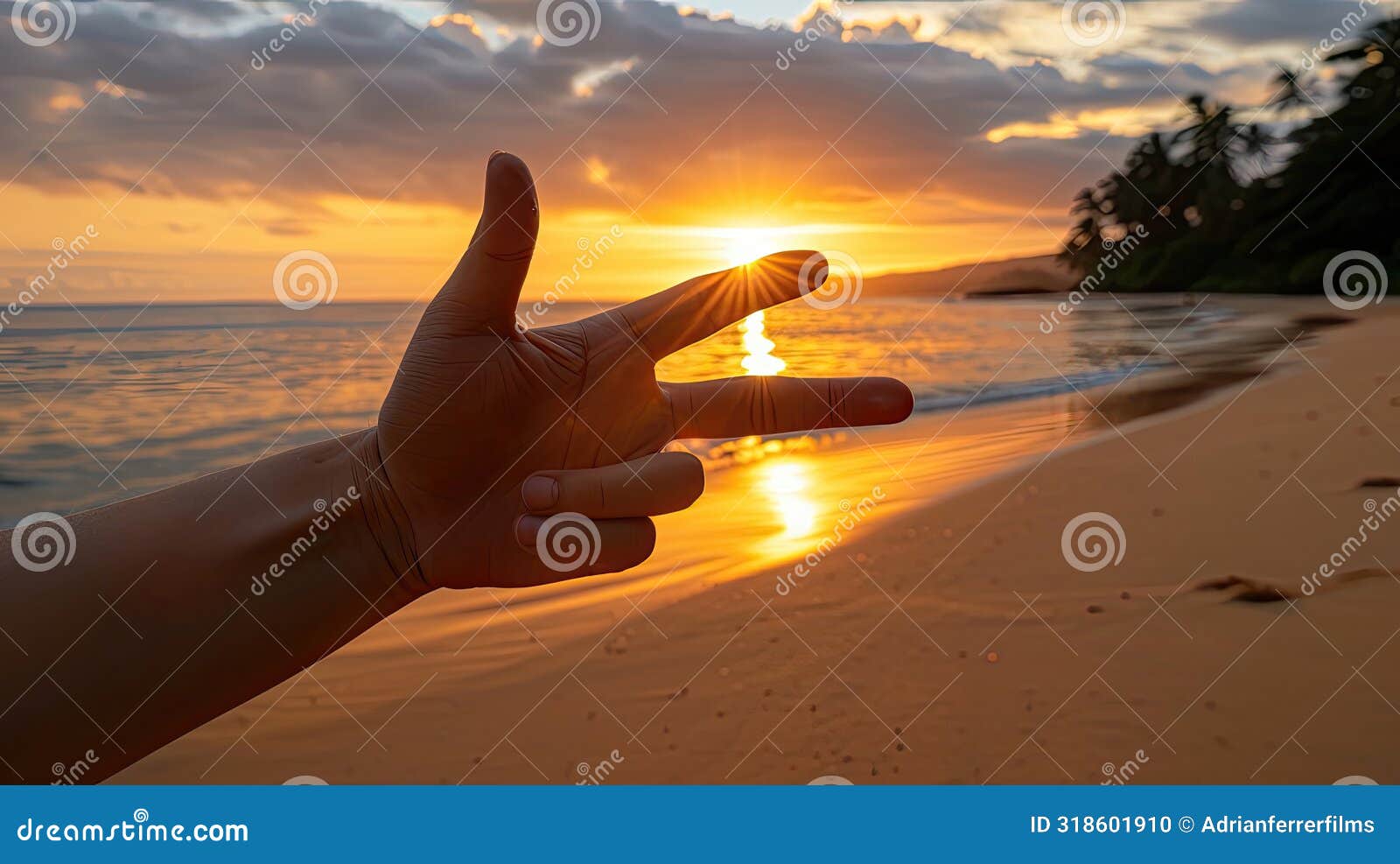 A Hand is Pointing at the Sun on a Beach Stock Photo - Image of travel ...