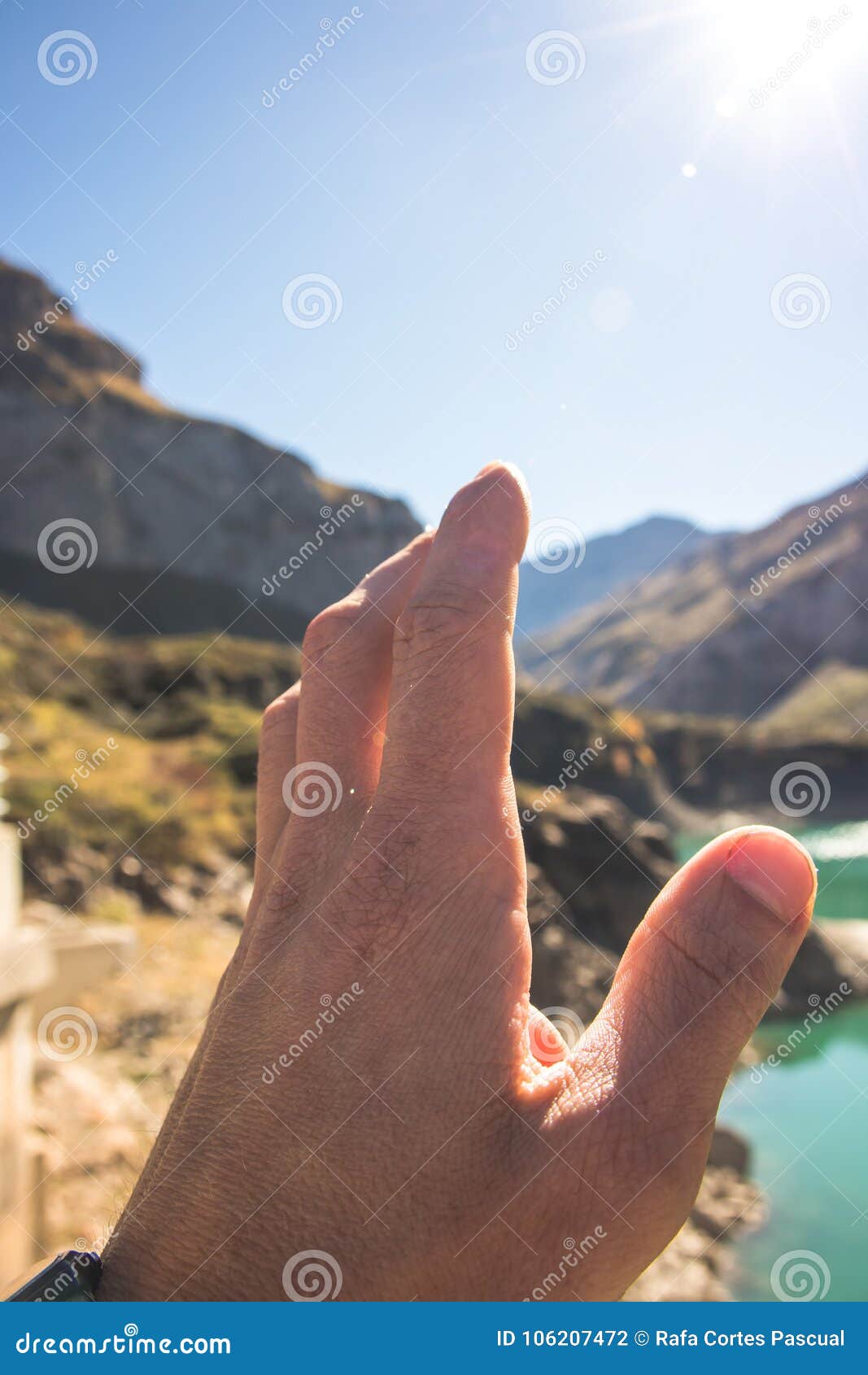 Hand Pointing To the Mountains in the Background Stock Photo - Image of ...