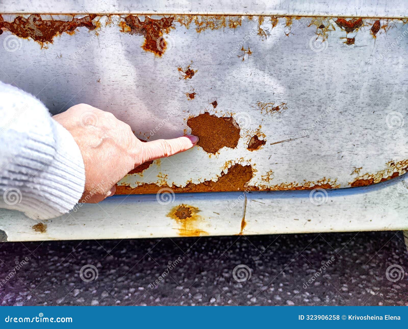 A Hand Points at Rust Damage on a Cars Body Panel Stock Photo - Image ...