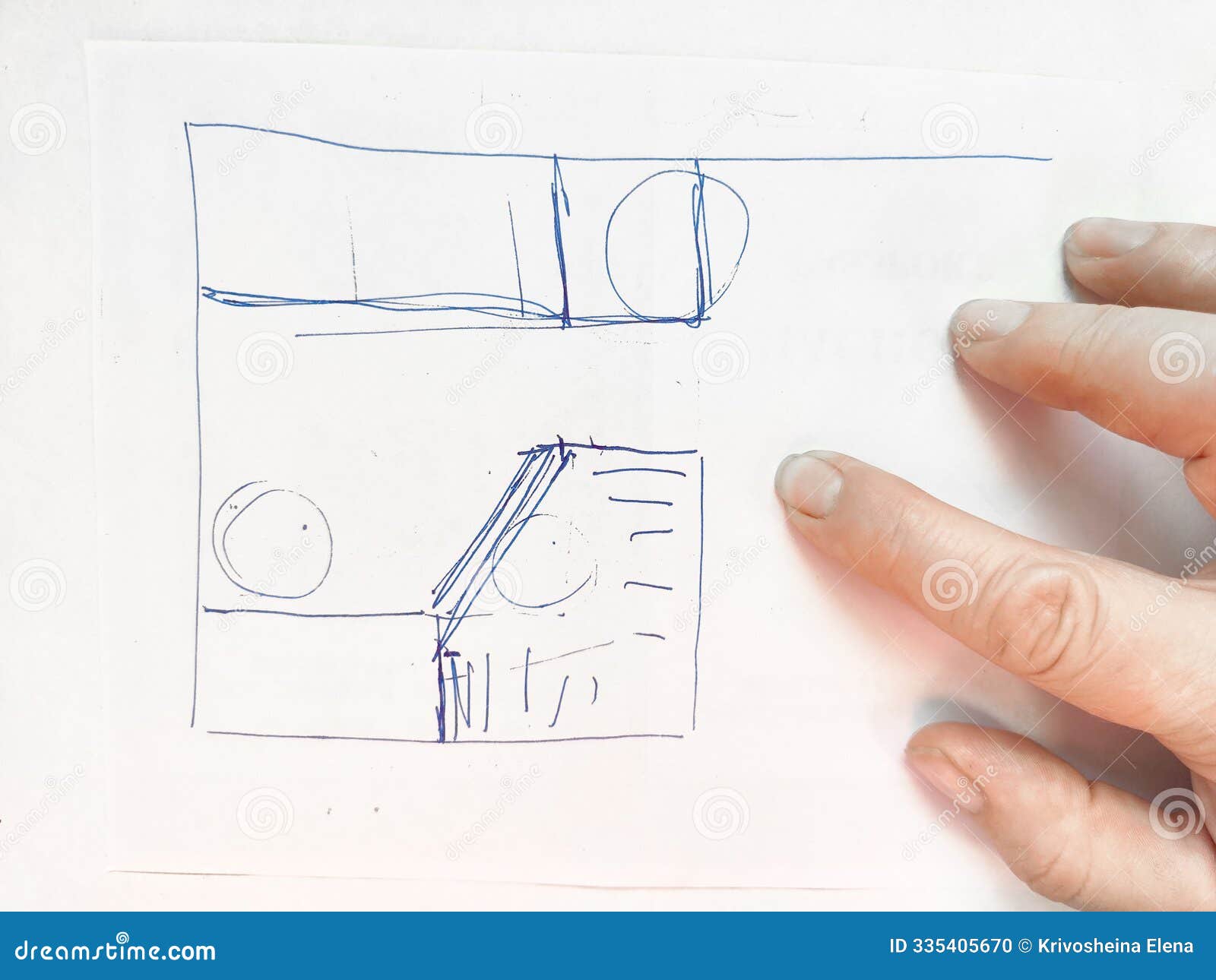 A Hand Points at a Sketch Displaying Geometric Shapes and Design ...