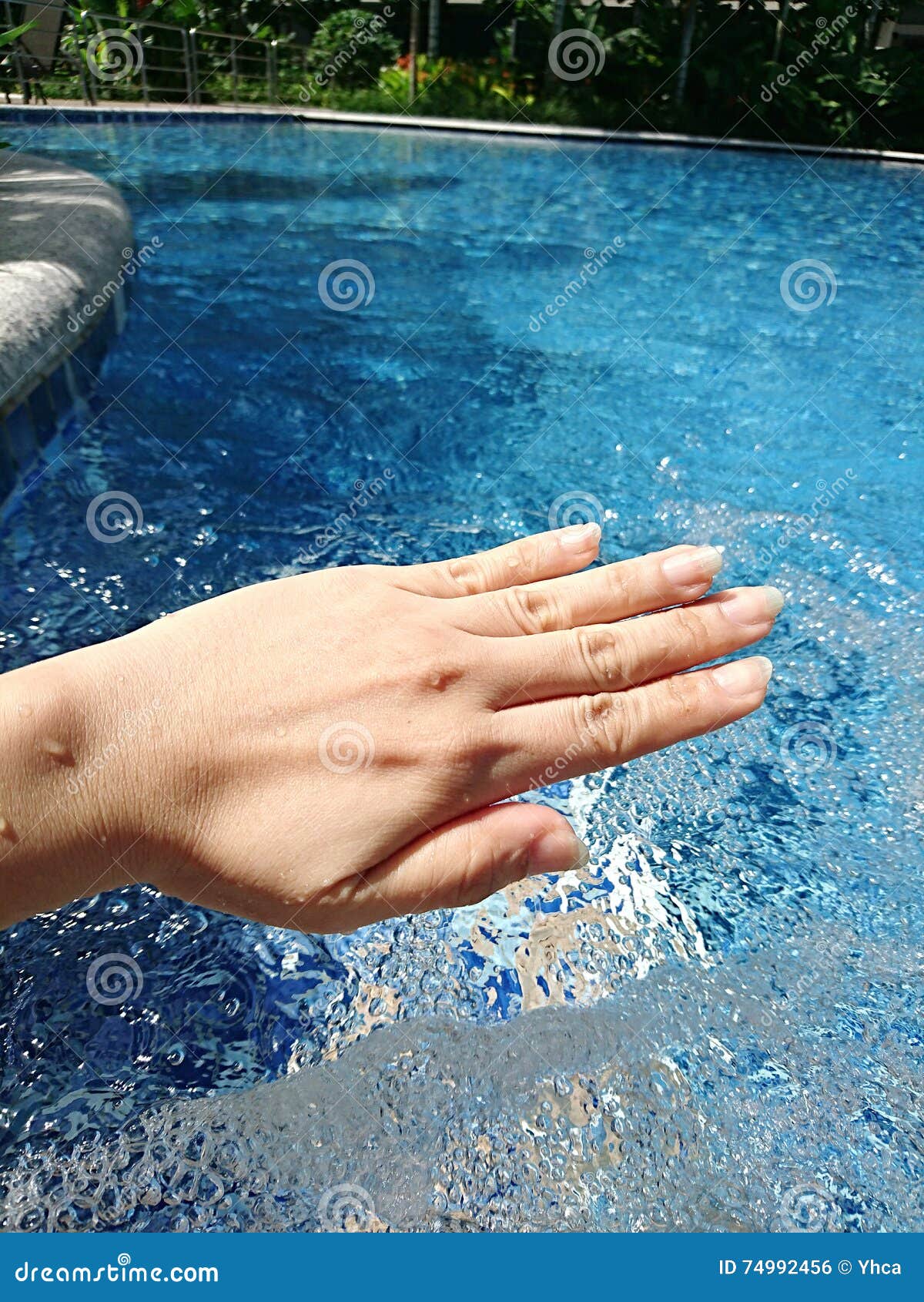 Hand by the pool stock photo. Image of hand, pool, body - 74992456