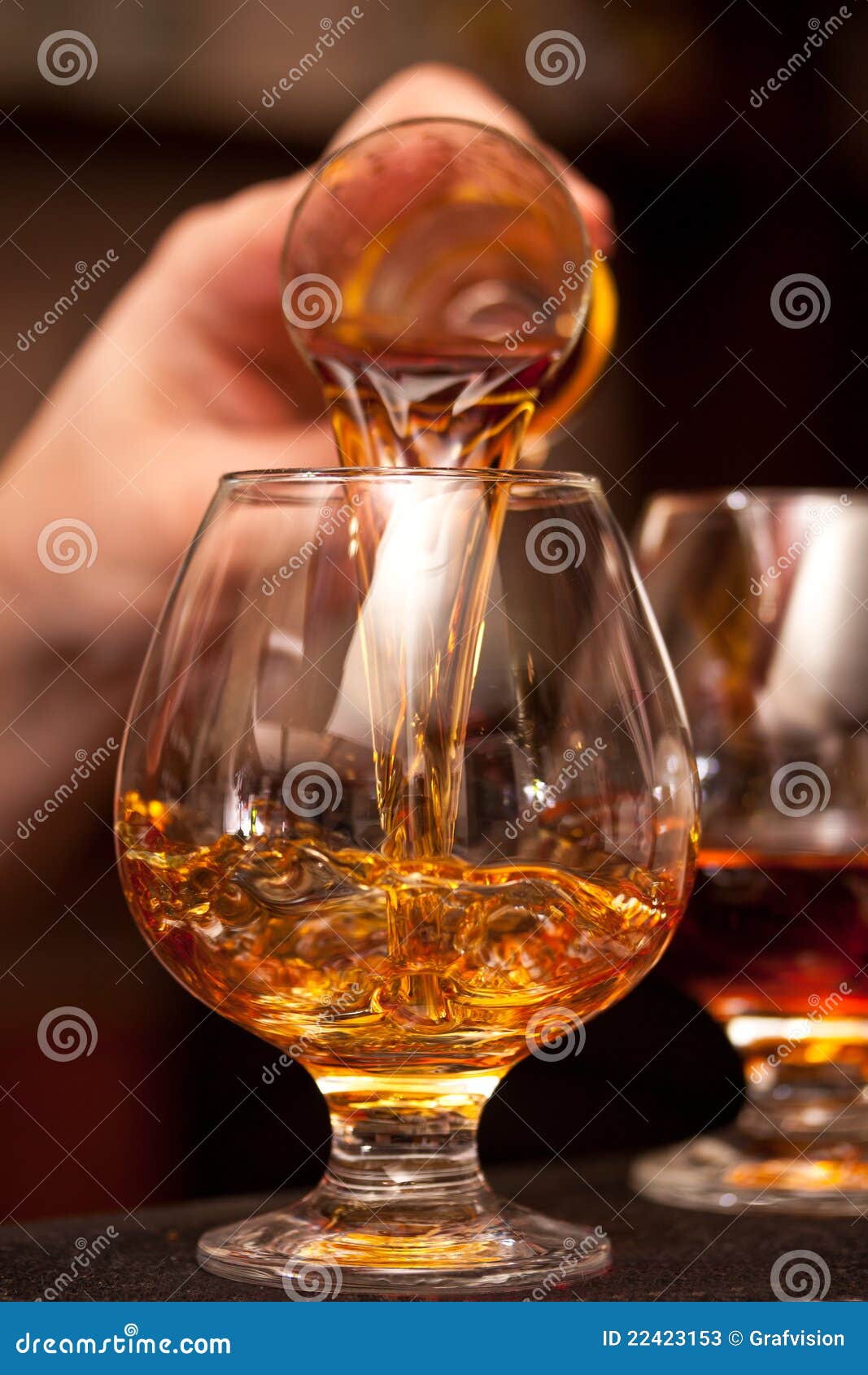 Hand pouring alcohol stock image. Image of fragility - 22423153