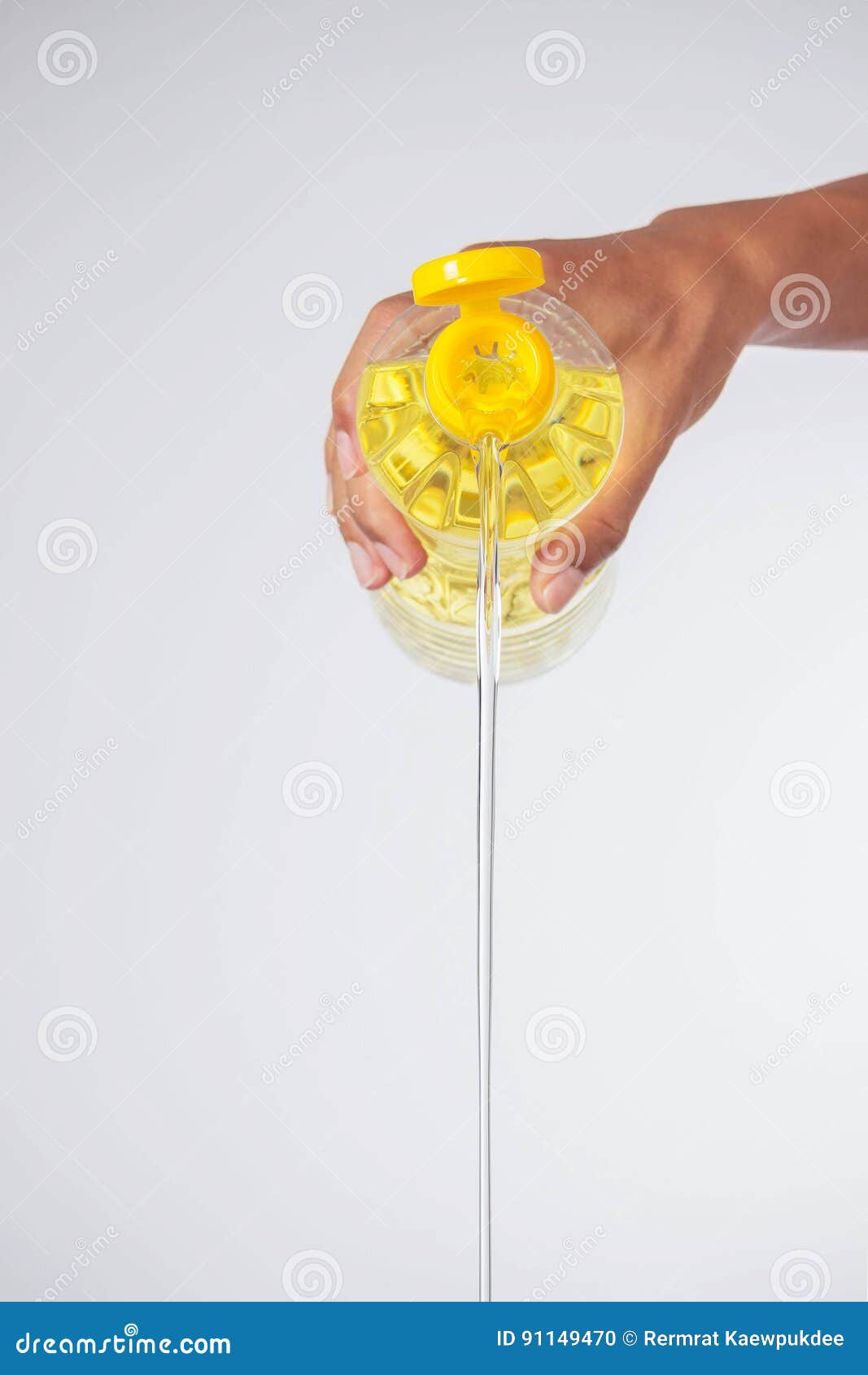 Hand is pouring oil. stock photo. Image of fresh, professional - 91149470