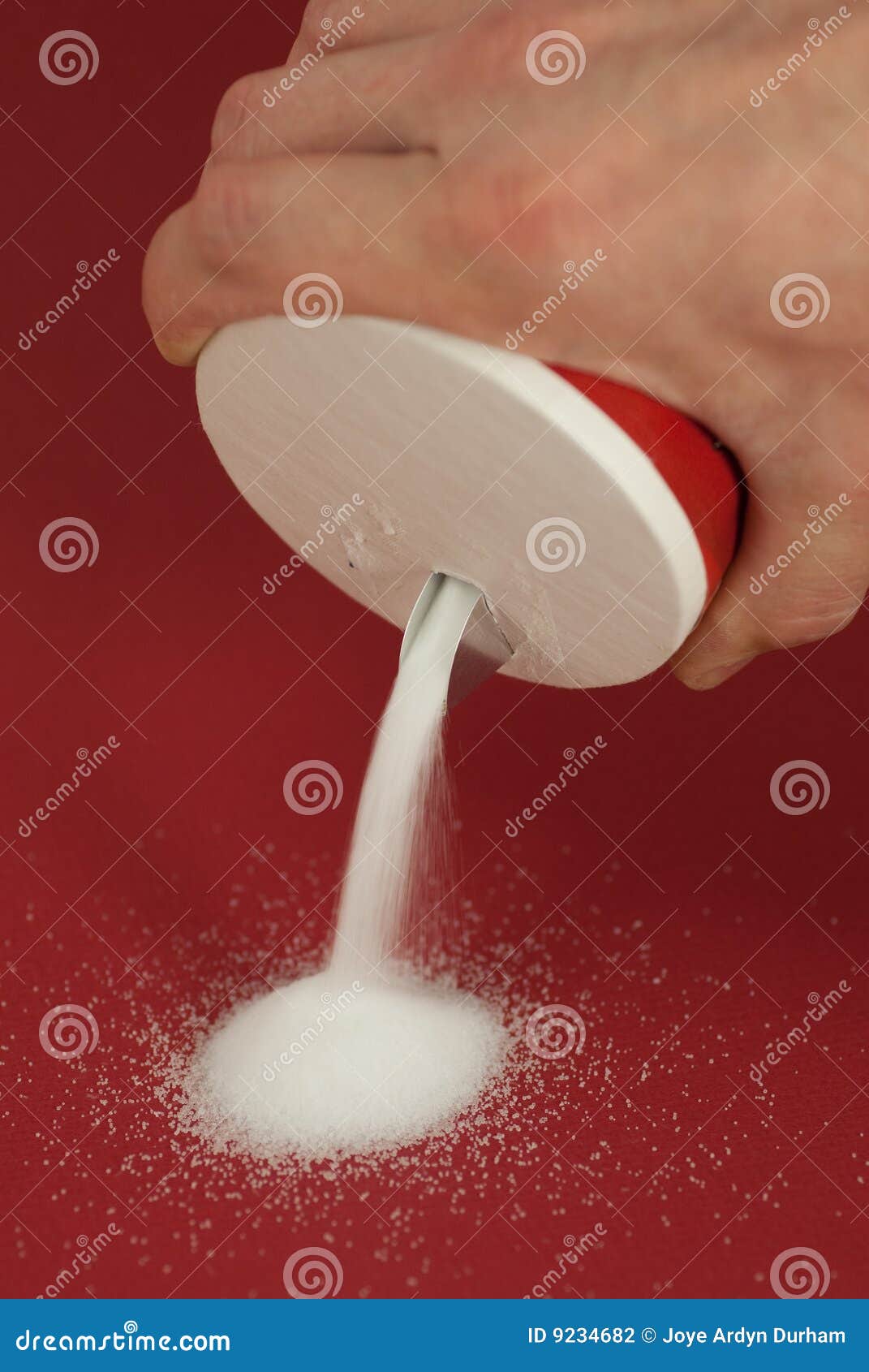 Hand pouring salt stock photo. Image of sodium, created - 9234682