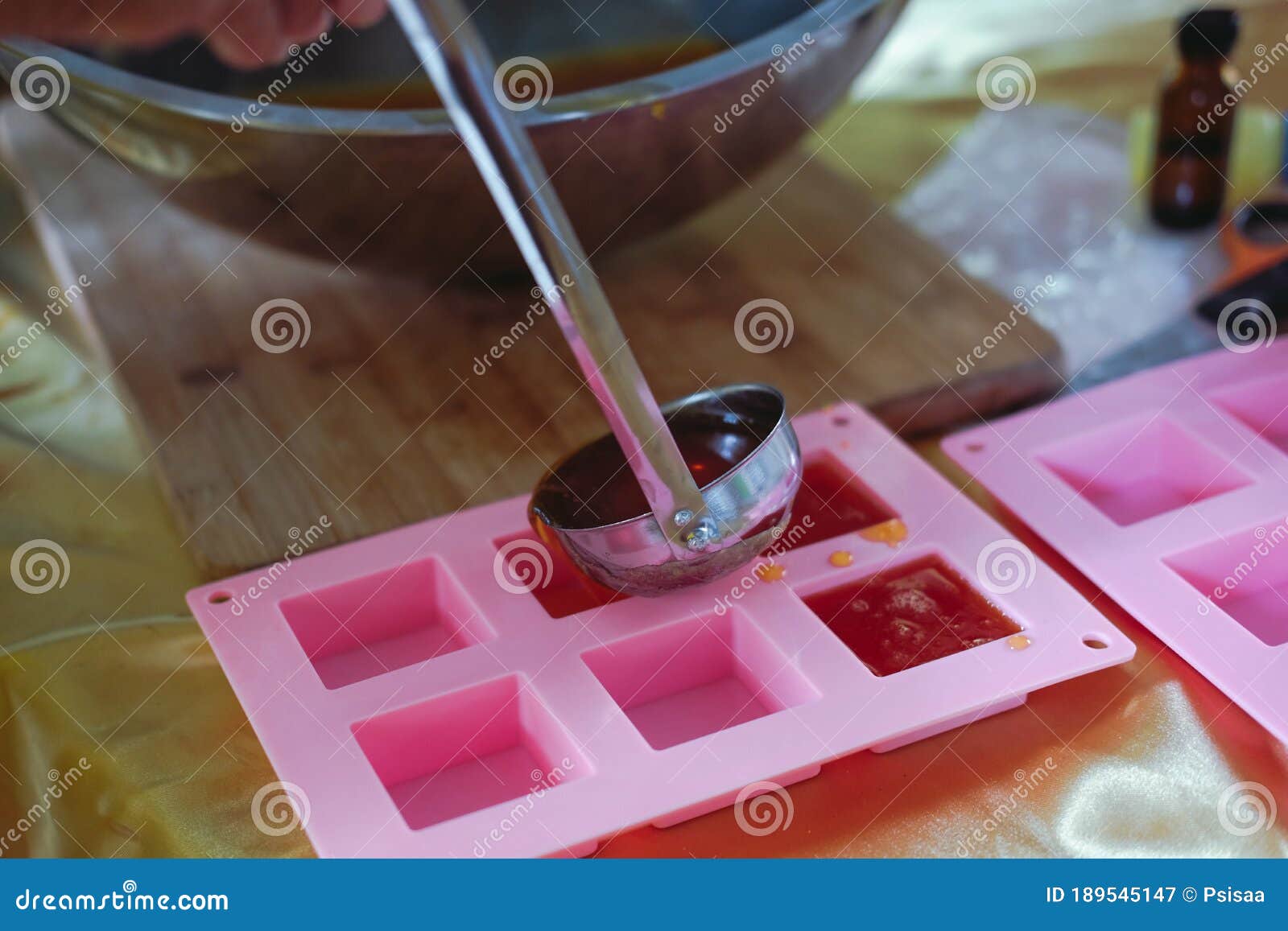Hand Pouring Soap Mixture on Plastic Form Stock Image - Image of ...