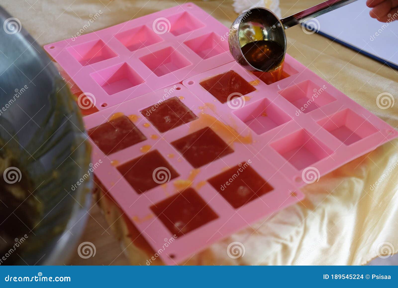 Hand Pouring Soap Mixture on Plastic Form Stock Photo - Image of ...