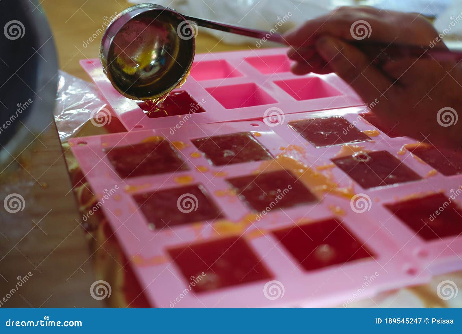 Hand Pouring Soap Mixture on Plastic Form Stock Image - Image of ...