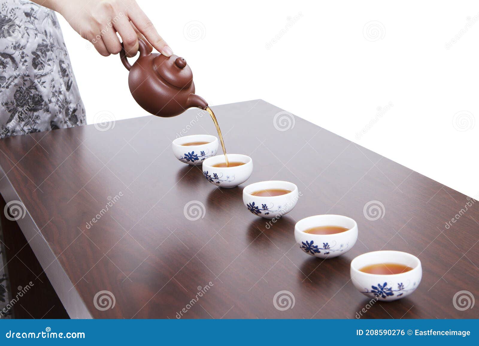 A Hand in Pouring Tea Closeup Stock Photo - Image of relaxation, china ...