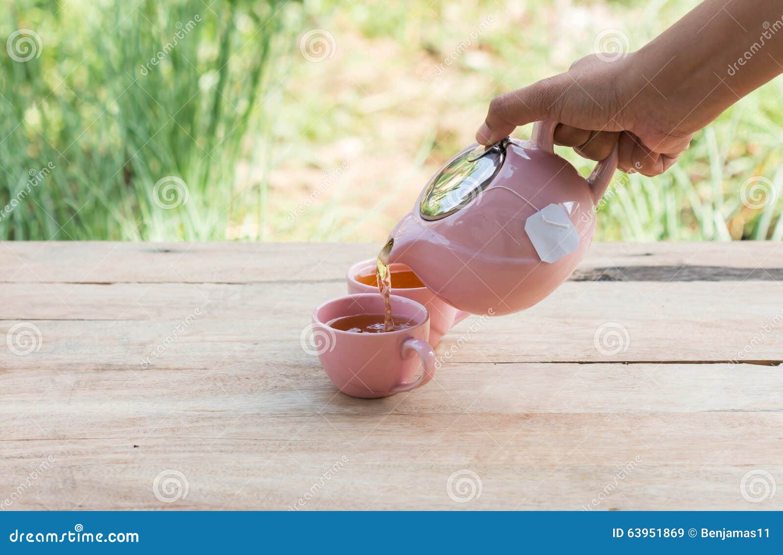 Hand pouring tea stock image. Image of asia, hand, culture - 63951869