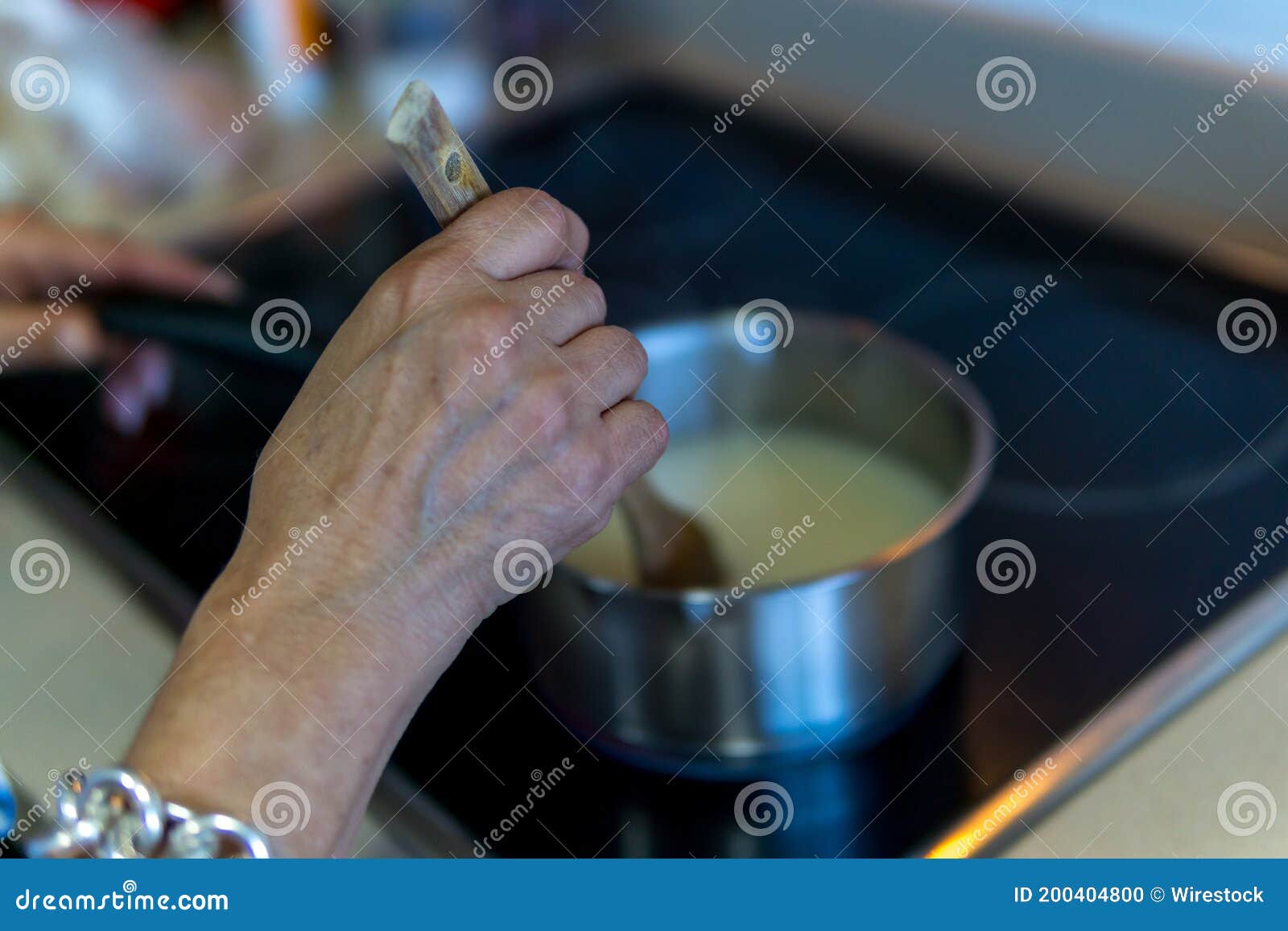 Hand Preparing a Bowl of Soup at Home Stock Photo - Image of food ...