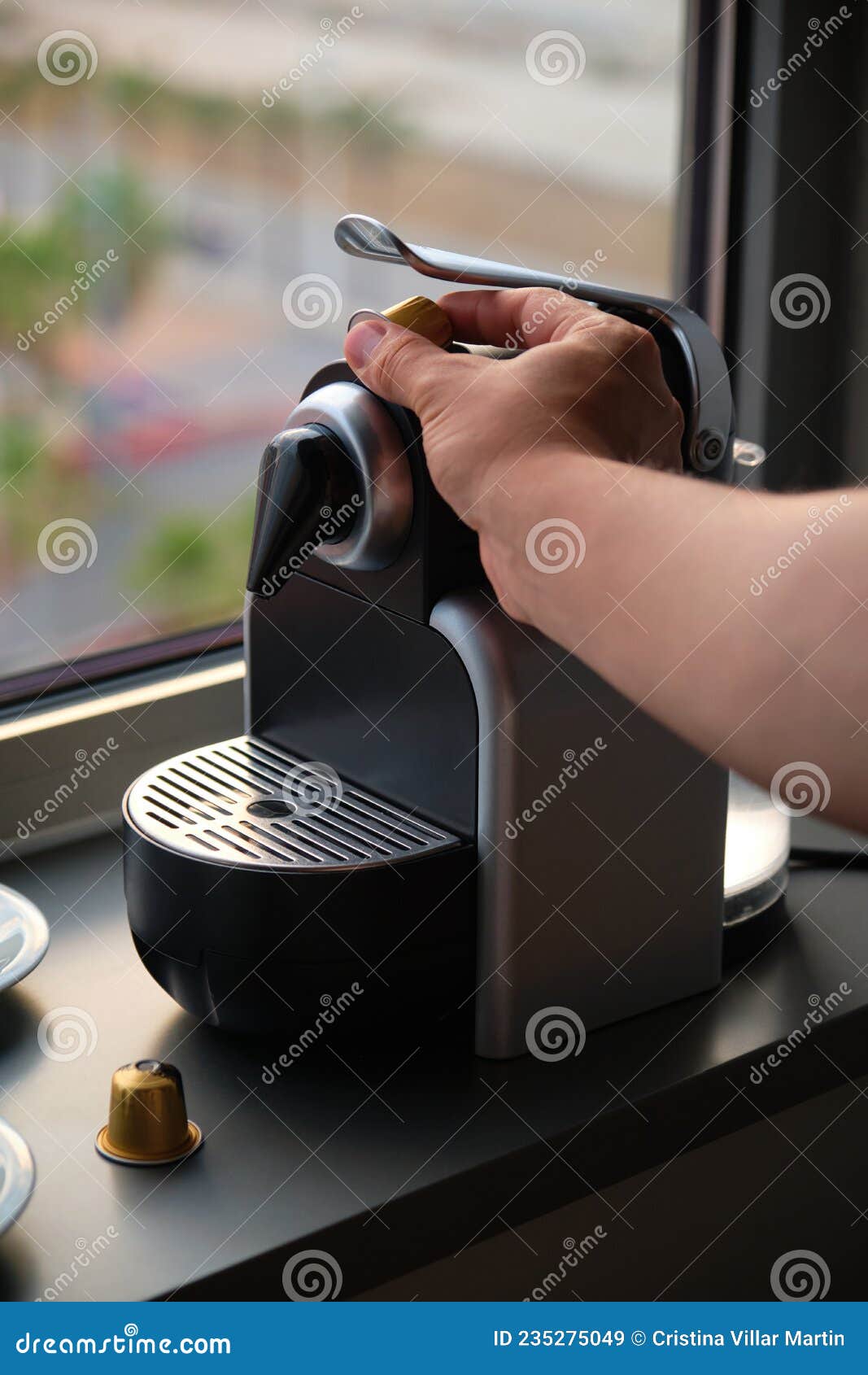 Hand Preparing Coffee in a Coffee Machine with Capsules. Stock Image ...