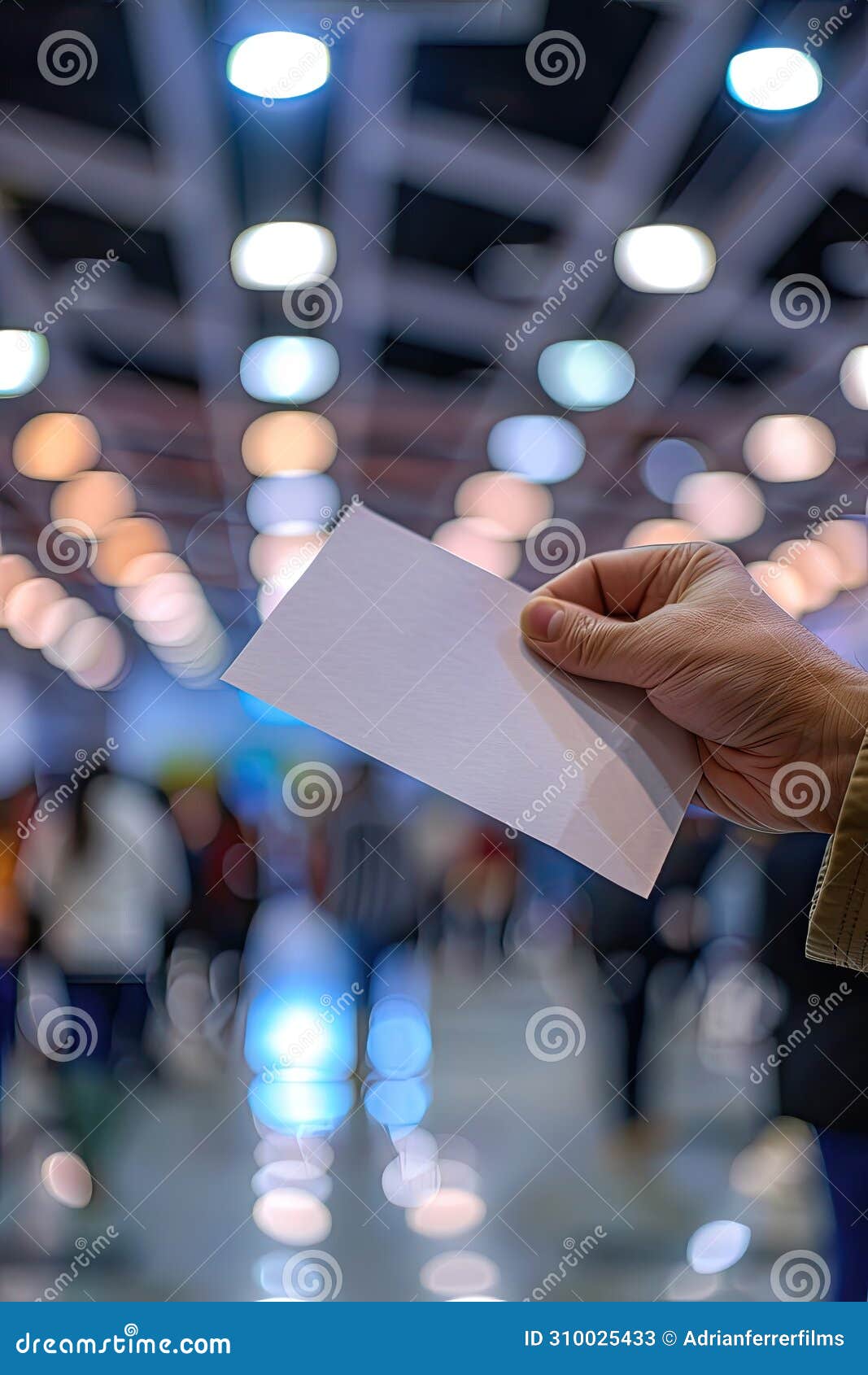 Hand Presenting a Piece of Paper Against an Abstract Light Backdrop ...