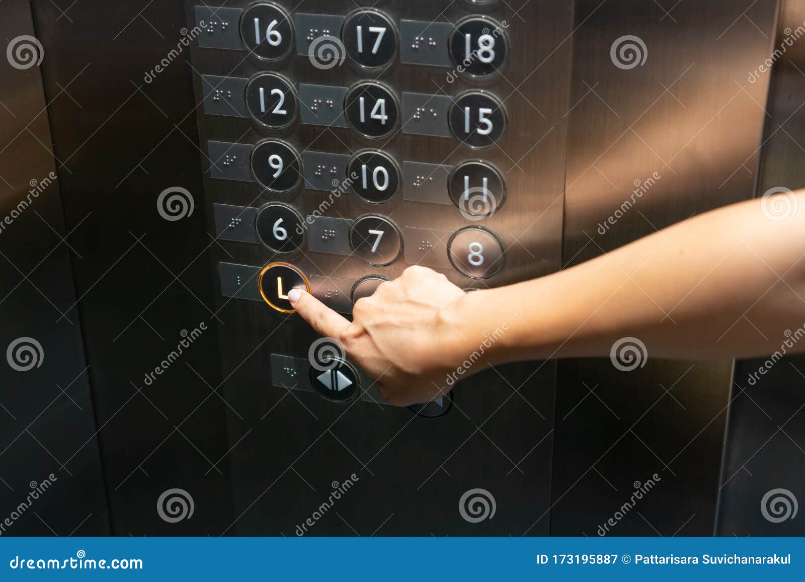 The Hand Presses on the Lobby Floor Elevator Button in Hotel Stock ...
