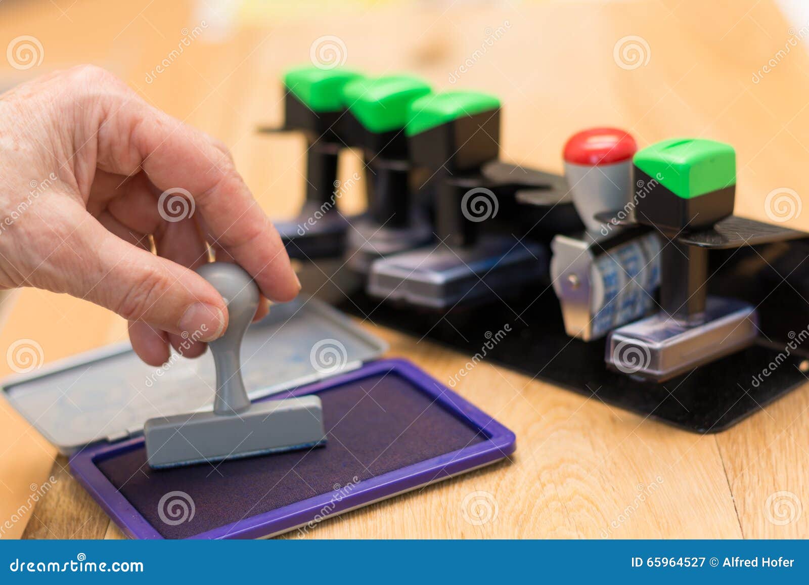 Hand Presses Stamp in Stamp Pad - Closeup Stock Image - Image of ...