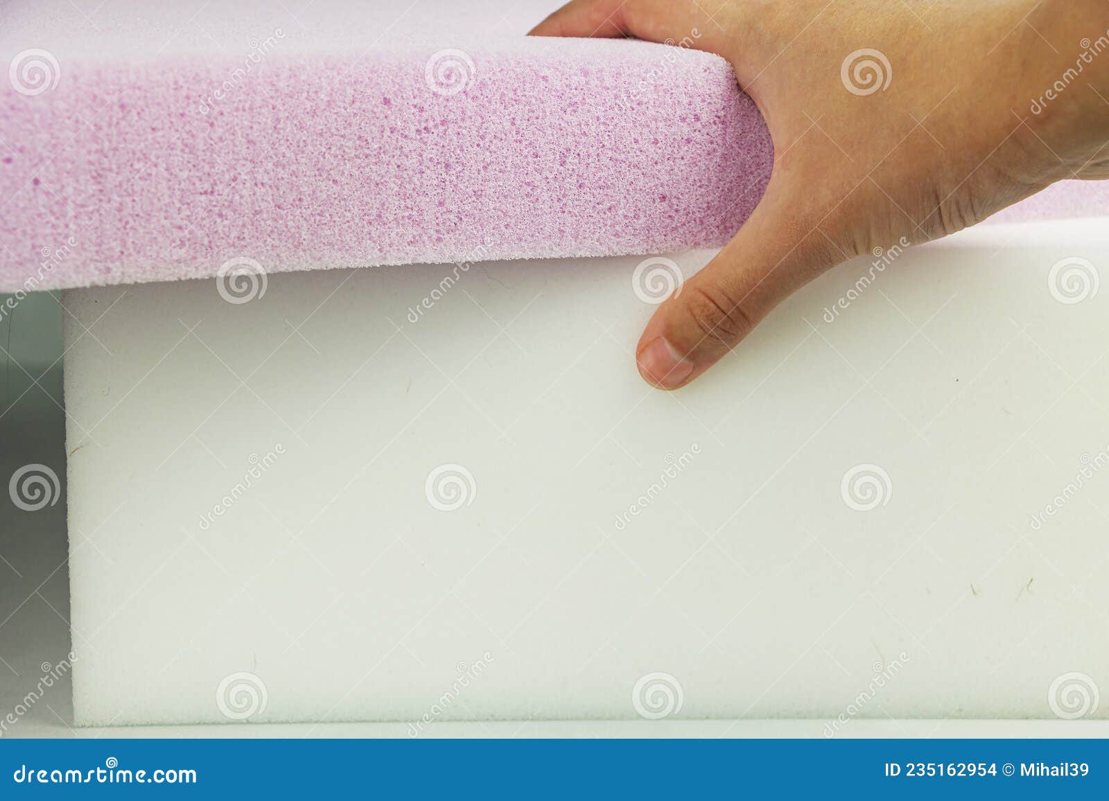 The Hand Presses on the Surface of the Rubber Foam. Checking Hardness ...