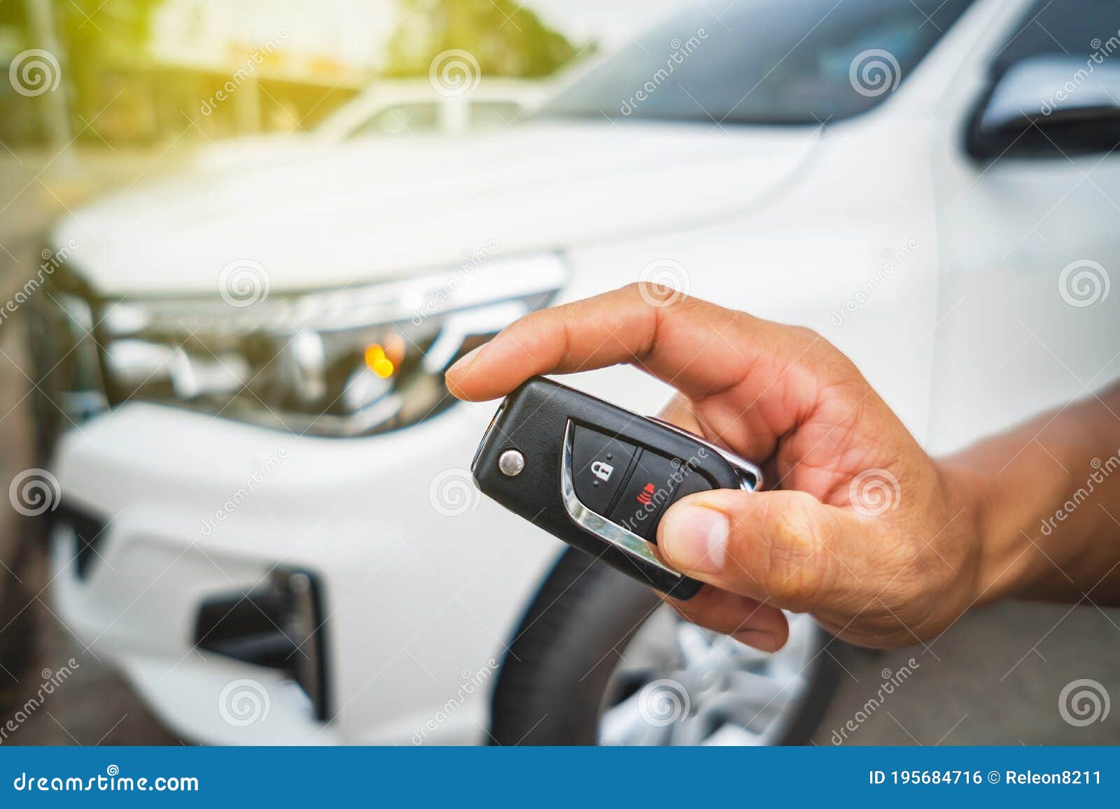 Hand Pressing the Button on the Remote To Lock or Unlock Stock Photo ...
