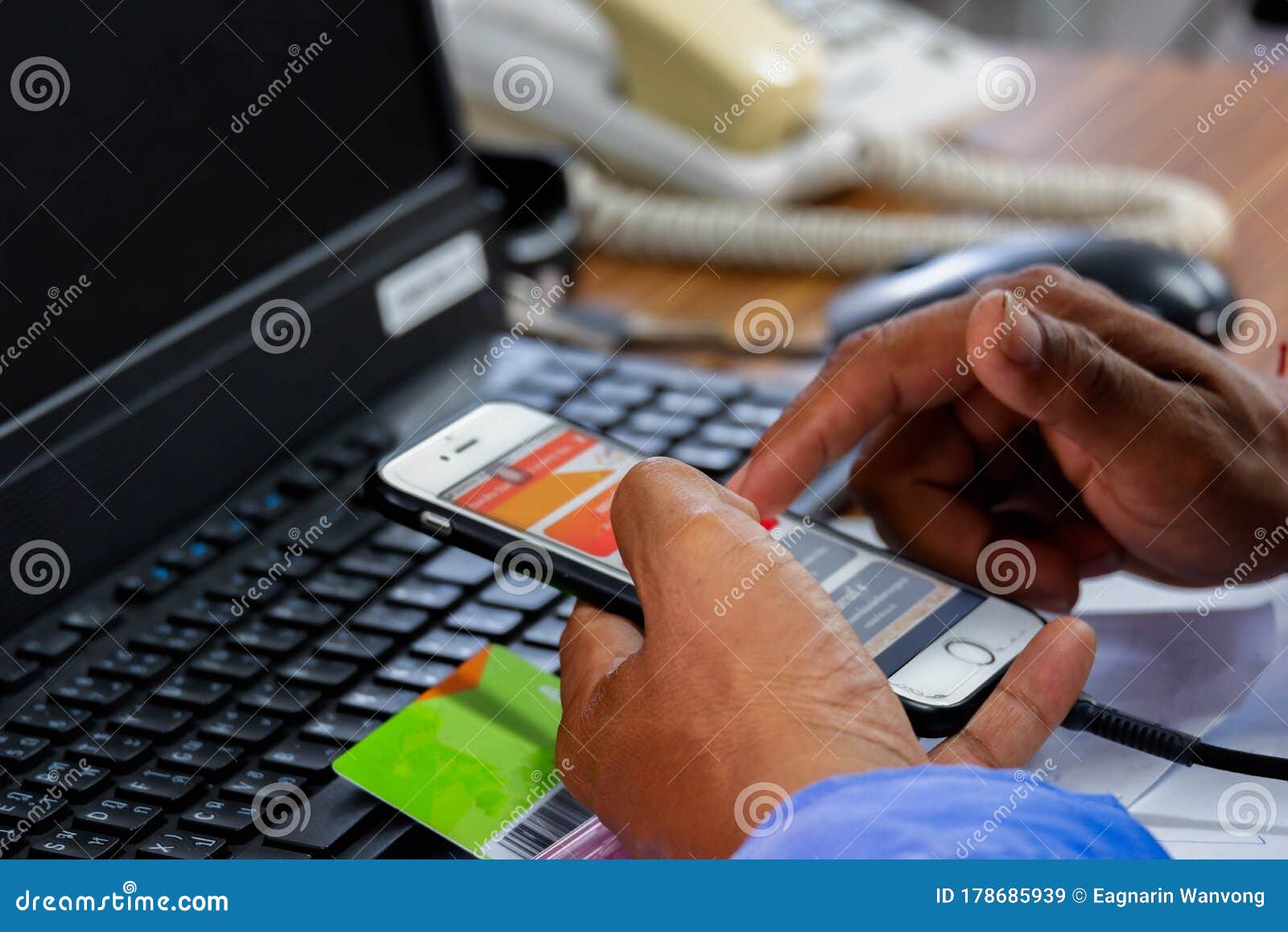 The Hand is Pressing the Phone at Work Stock Image - Image of keyboard ...