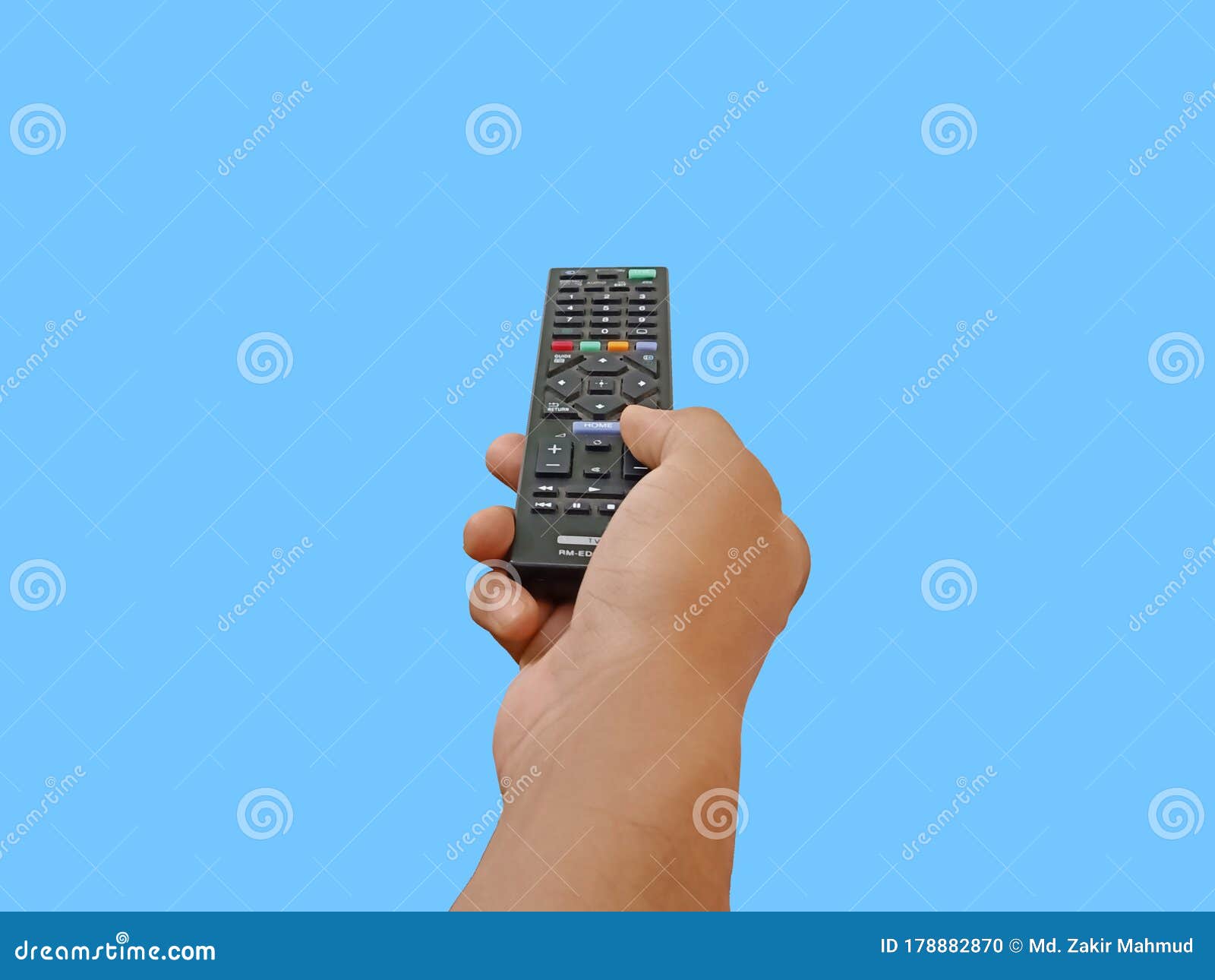 Hand Pressing Remote Control Isolated on Light Blue Background. Stock ...