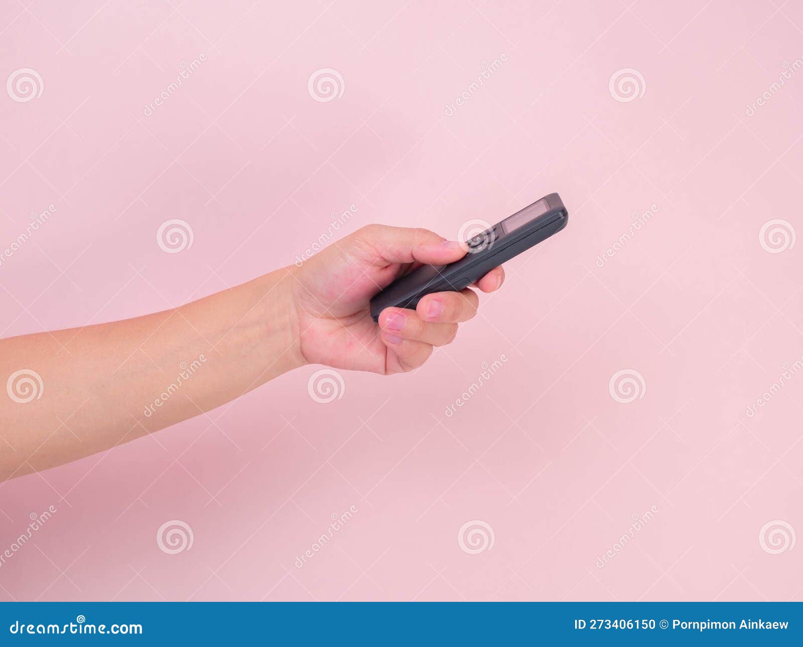 Hand Pressing Remote Control Isolated on Pink Background. Remote ...
