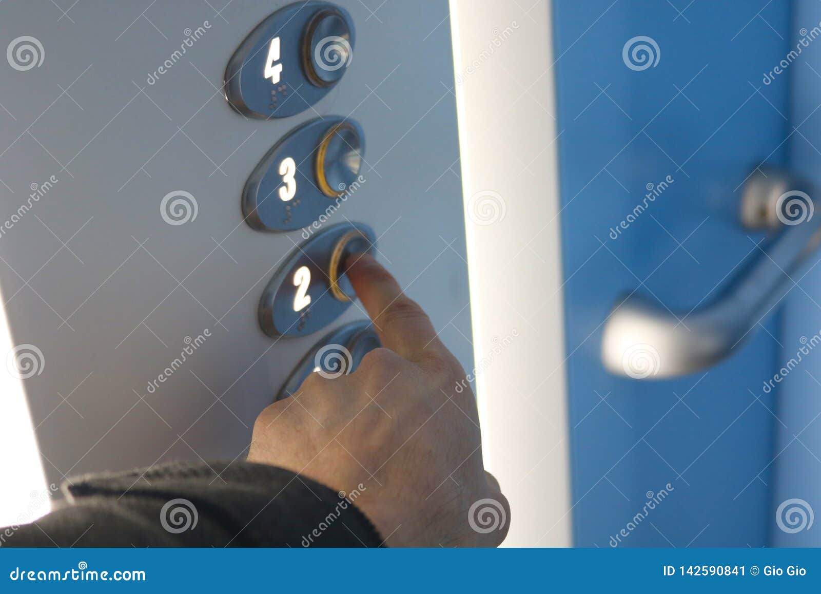 Hand Pressing Second Floor Button in an Elevator Stock Image - Image of ...