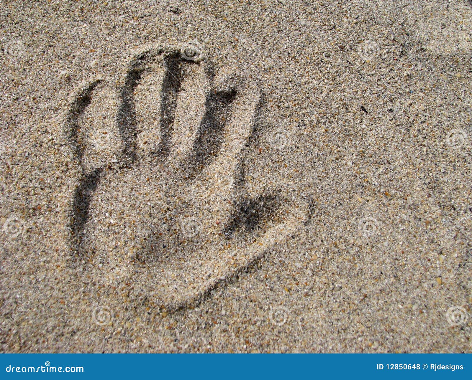 Hand print in sand stock photo. Image of hand, holiday - 12850648