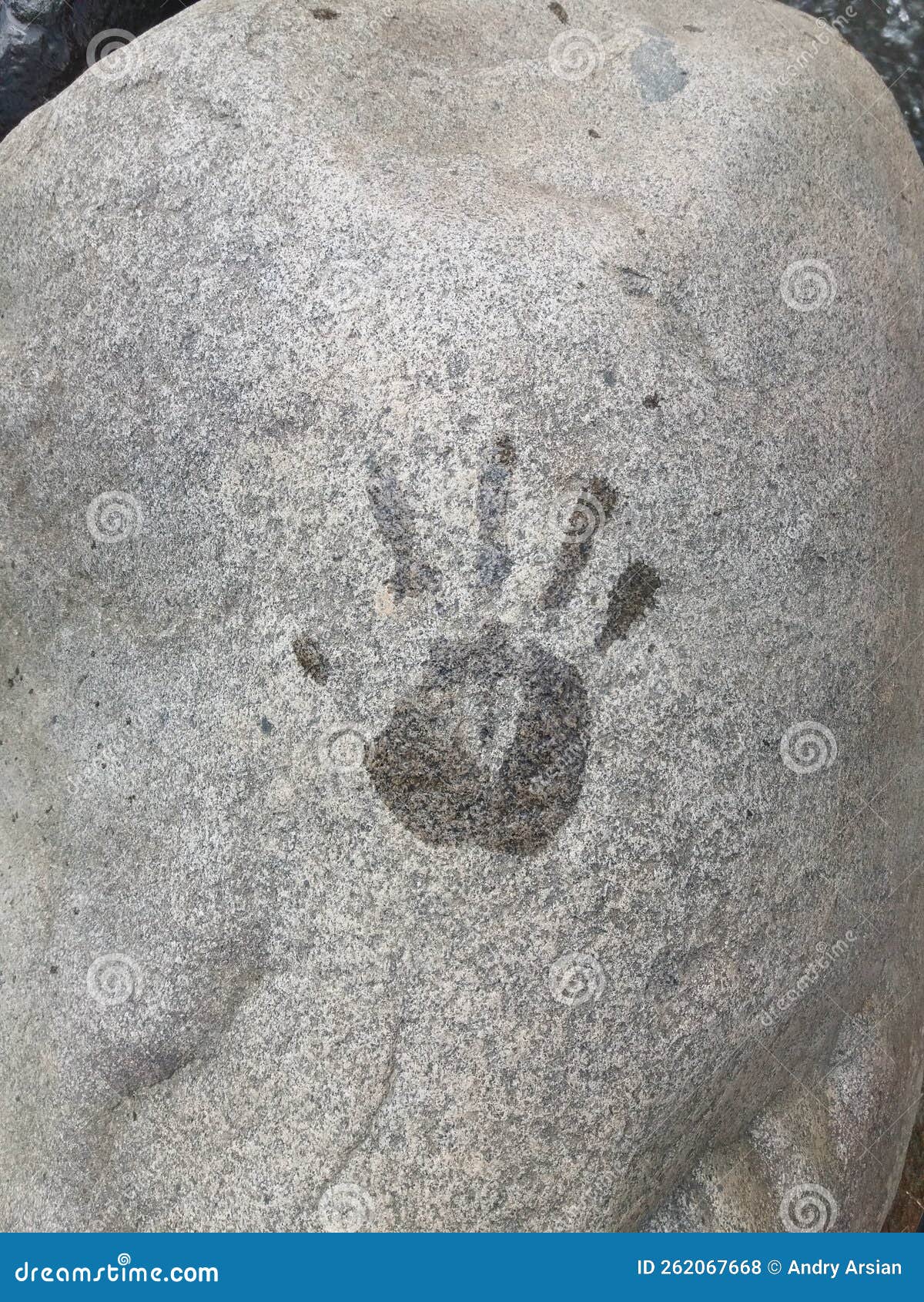 Hand print on the stone stock photo. Image of relief - 262067668