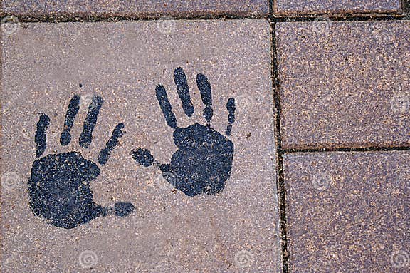 Hand Print in Stone stock photo. Image of detail, sidewalk - 39963014