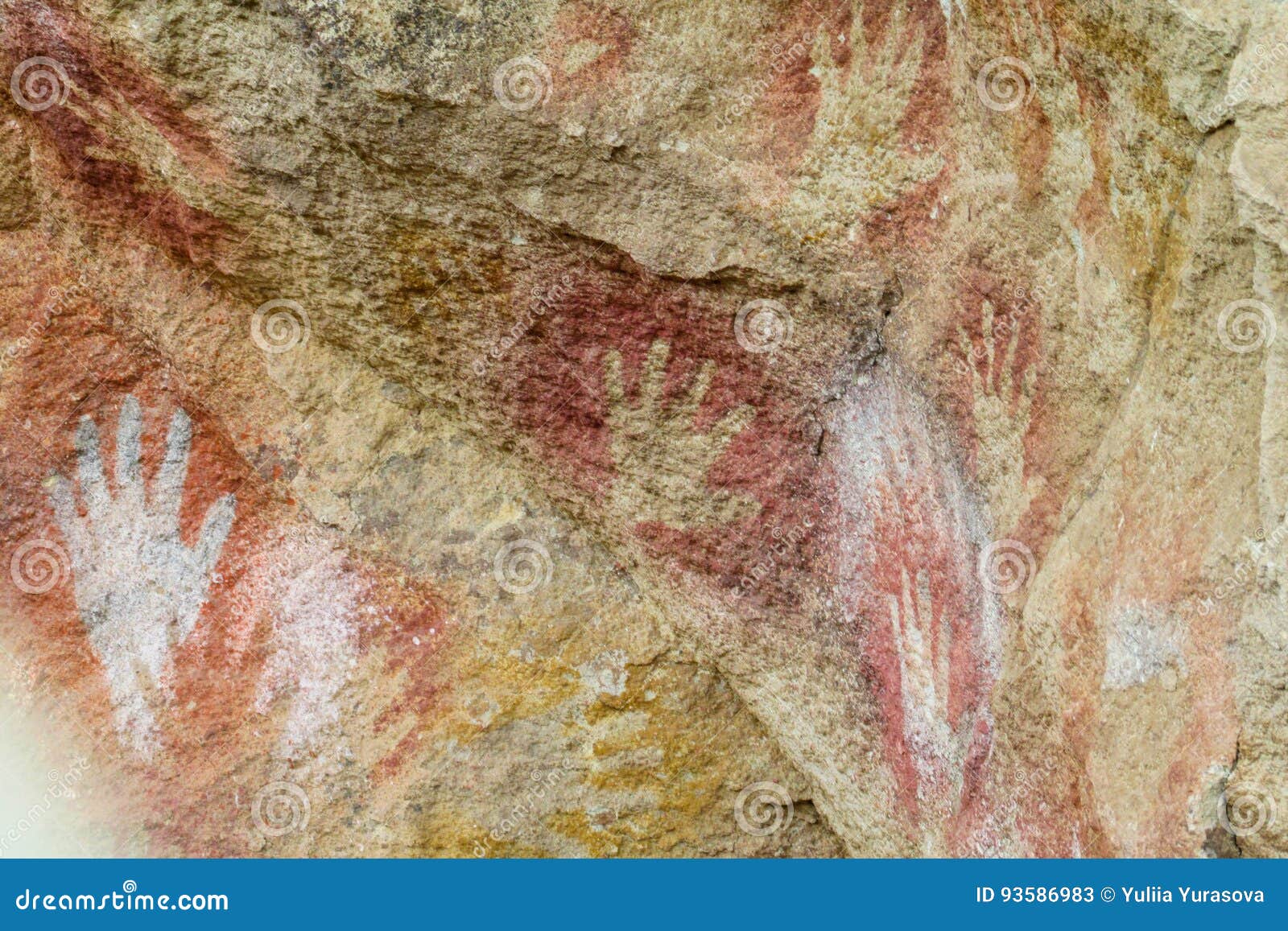 Hand prints on a cave wall stock image. Image of graphic - 93586983