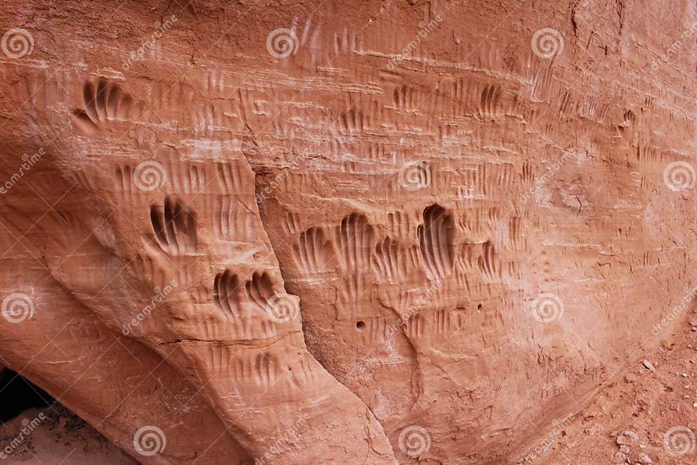 Hand prints in rock wall stock image. Image of fingers - 80456567