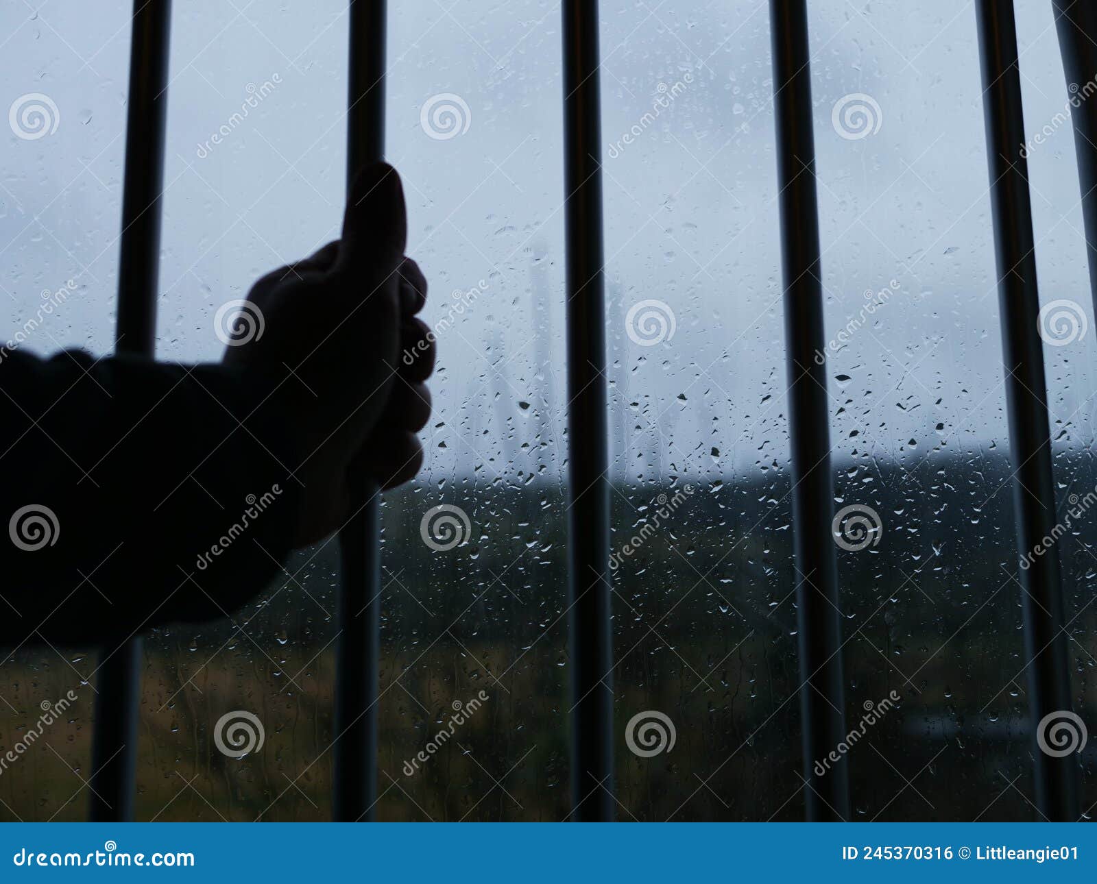 Hand of Prisoner in Chains Against Prison Bars Stock Photo - Image of ...