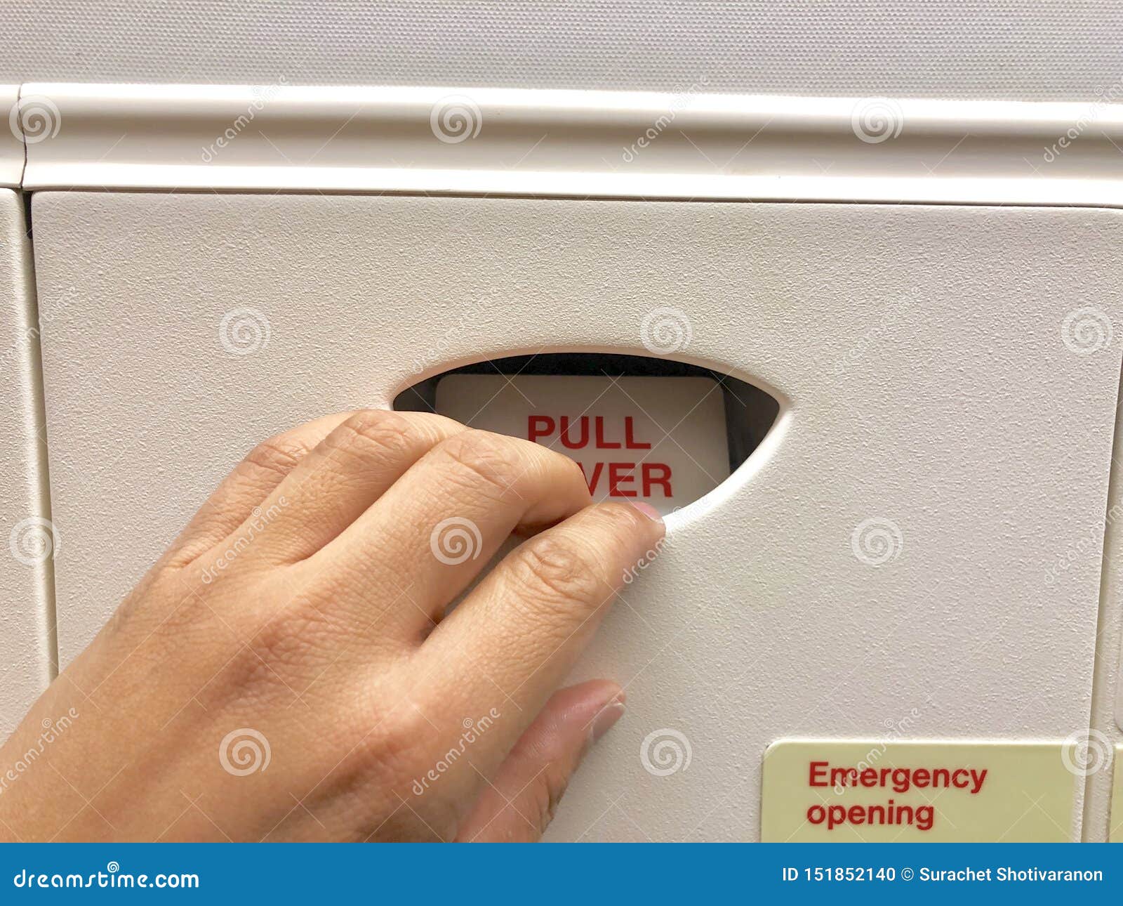 Hand on Pull Over Hole for Emergency Door on Plane Stock Photo - Image ...