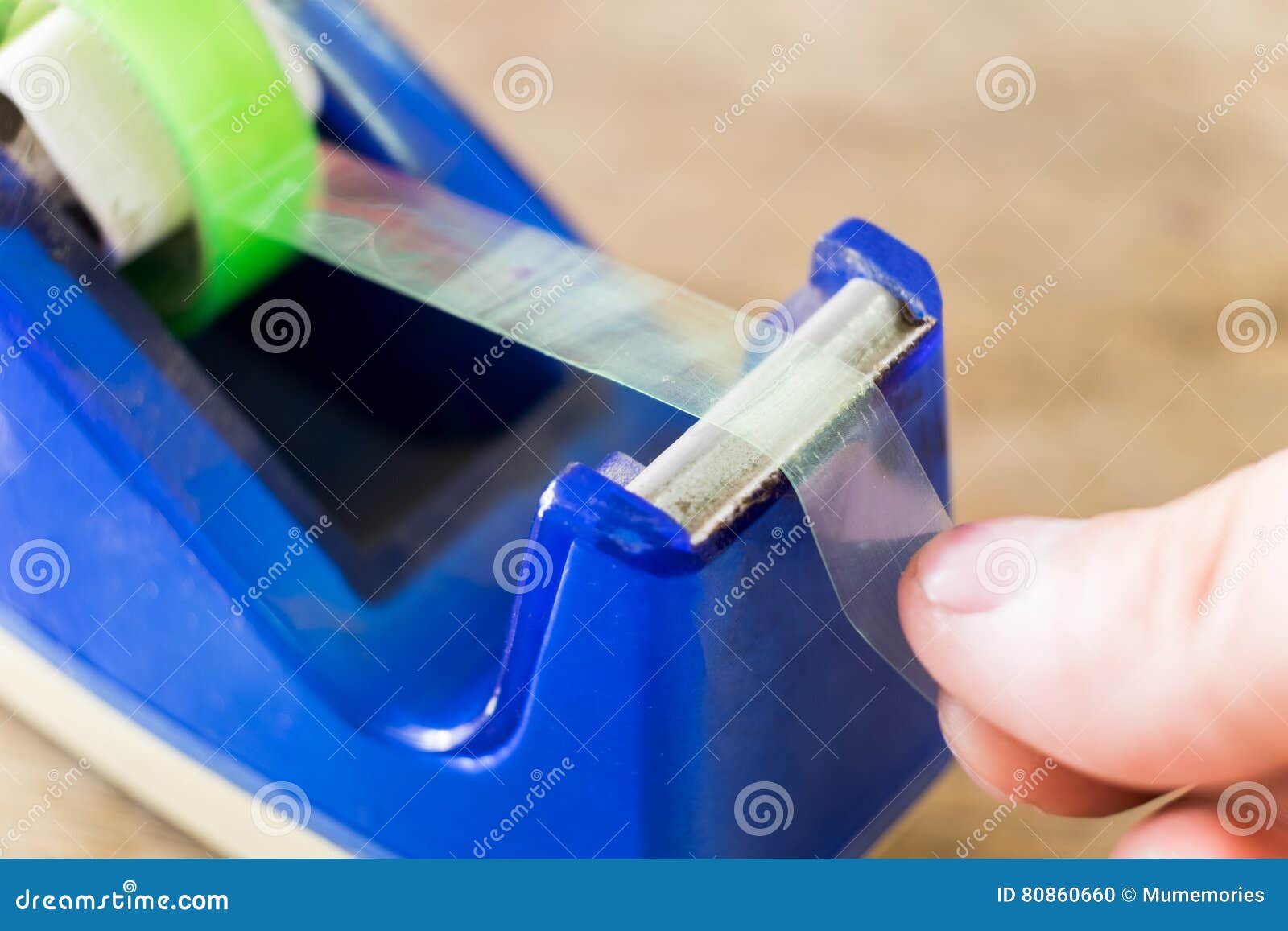 Hand Pulling Clear Adhesive Tape Stock Photo - Image of people, person ...
