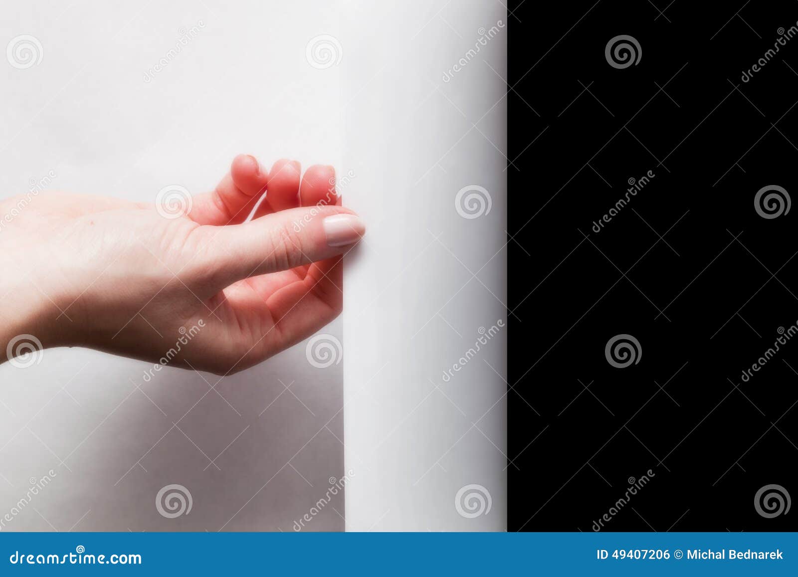 Hand Pulling Edge of Paper To Uncover, Reveal Something Stock Photo ...