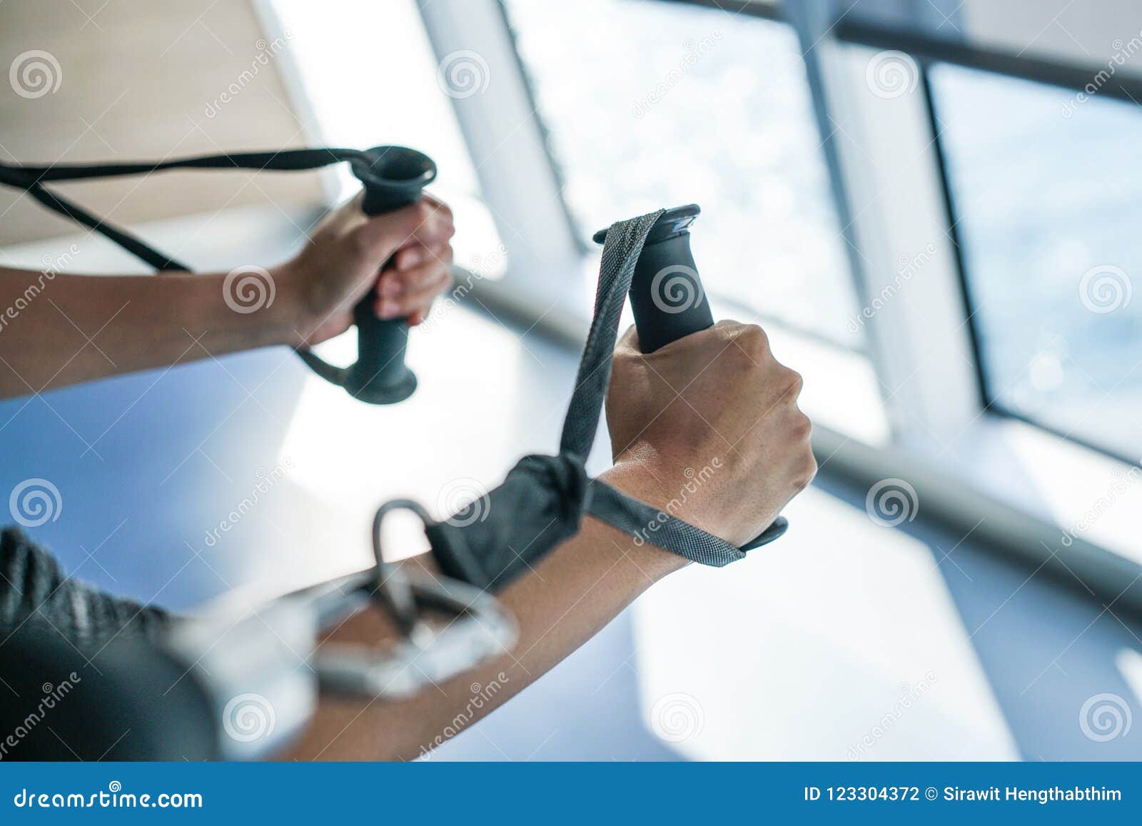 The Hand is Pulling the Fitness Machine in the Gym. Stock Photo - Image ...
